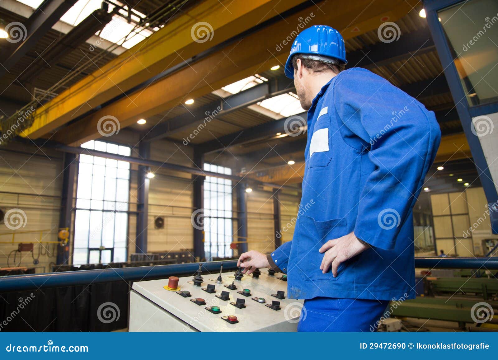 Construction Worker Operating a Machine Stock Photo - Image of male ...