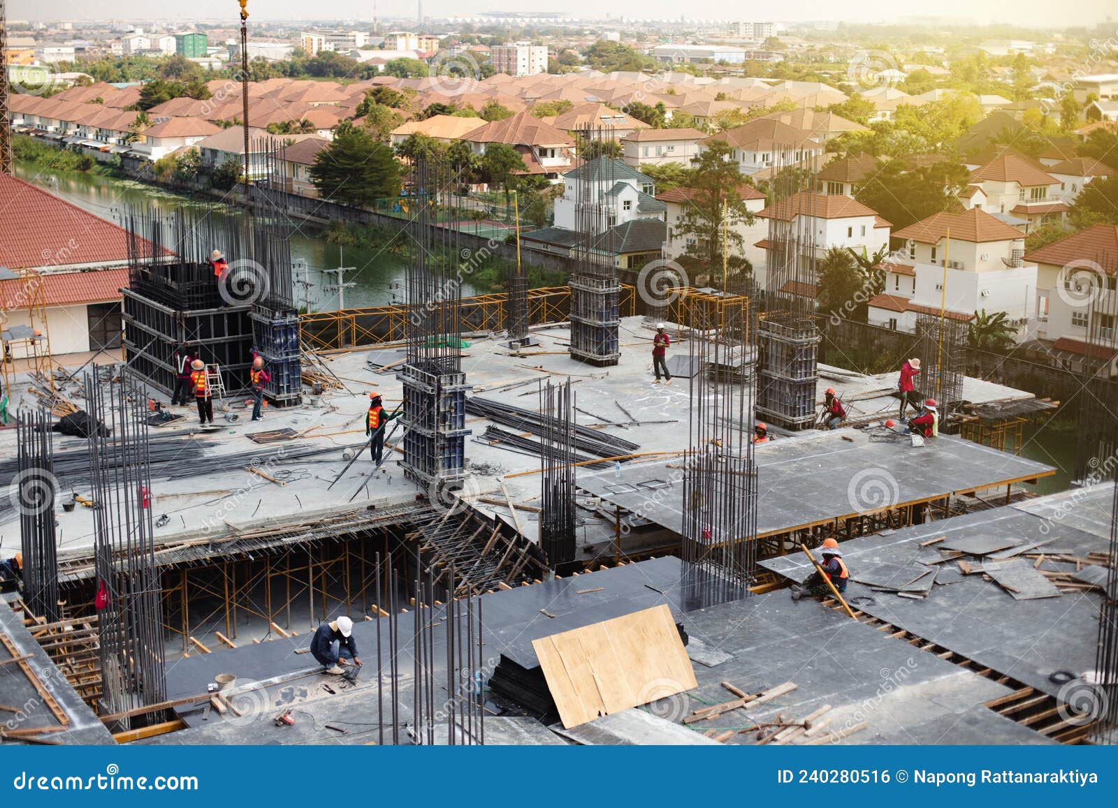 Construction Worker at the Outdoors Construction Site and Sunset ...