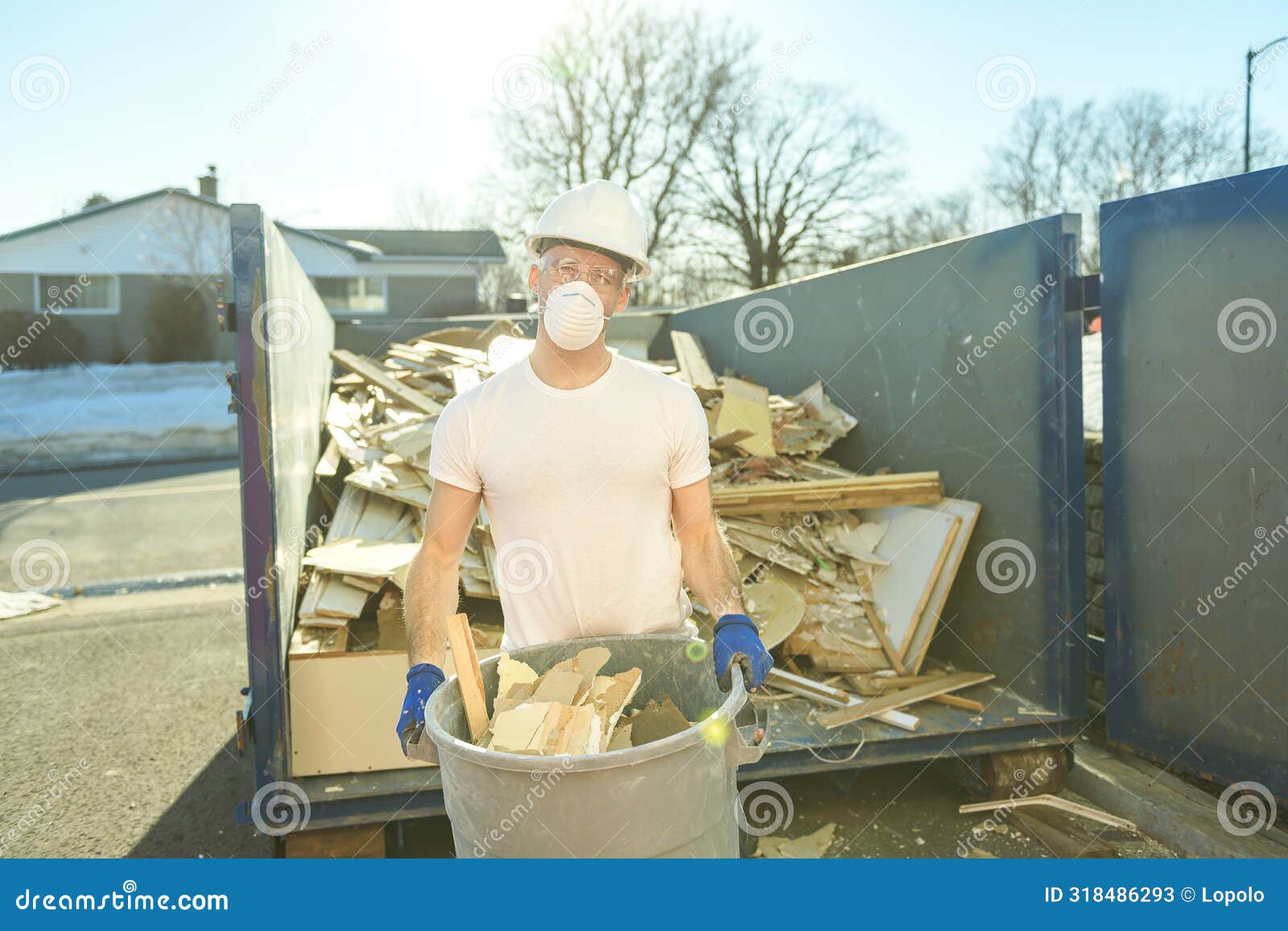 Construction Worker Outside of House Put Old Renovation Material on Big ...