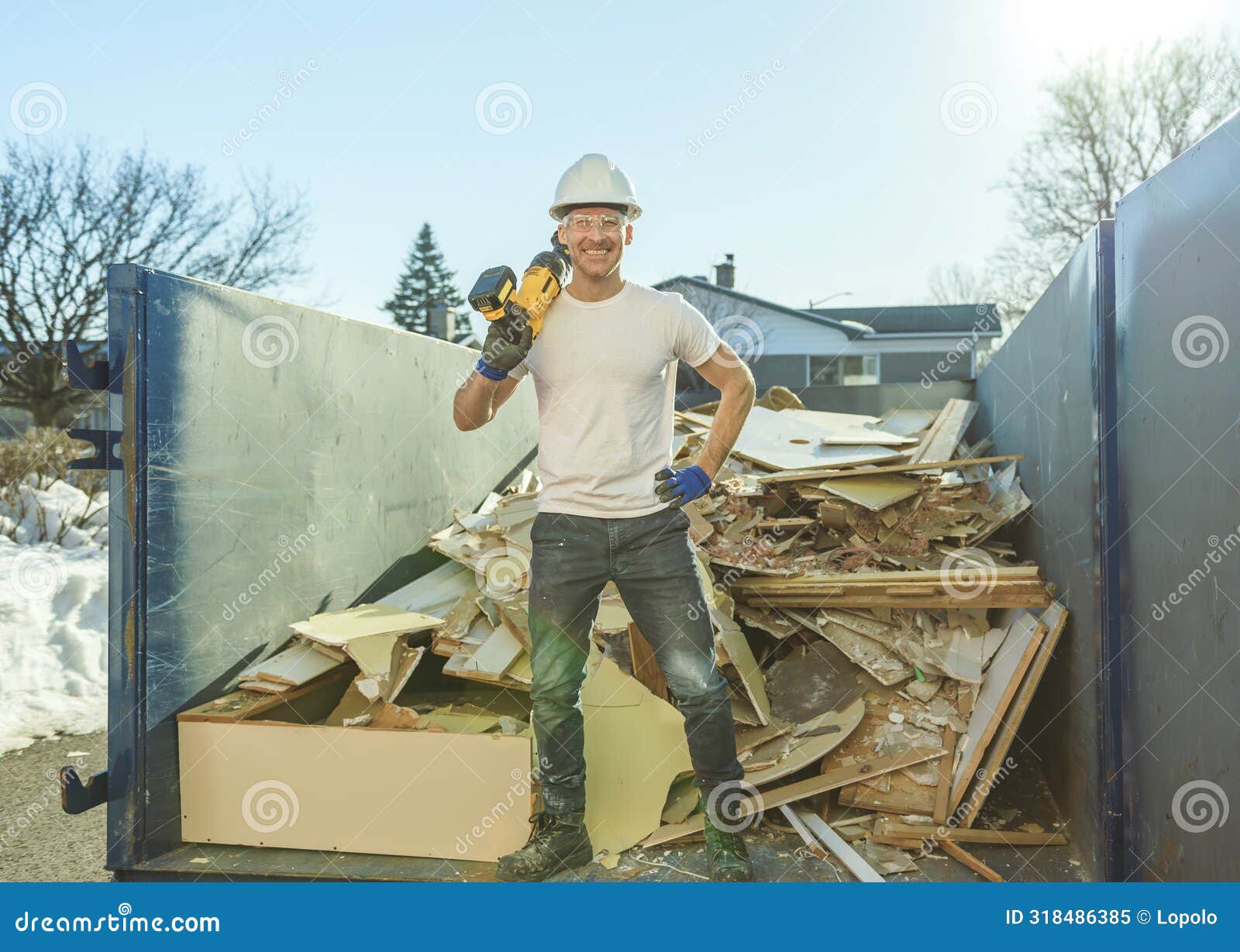 Construction Worker Outside of House Put Old Renovation Material on Big ...