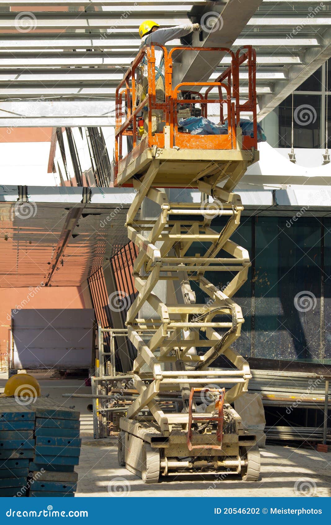 Construction Worker Painting Beam Using Lift Stock Photo - Image of ...