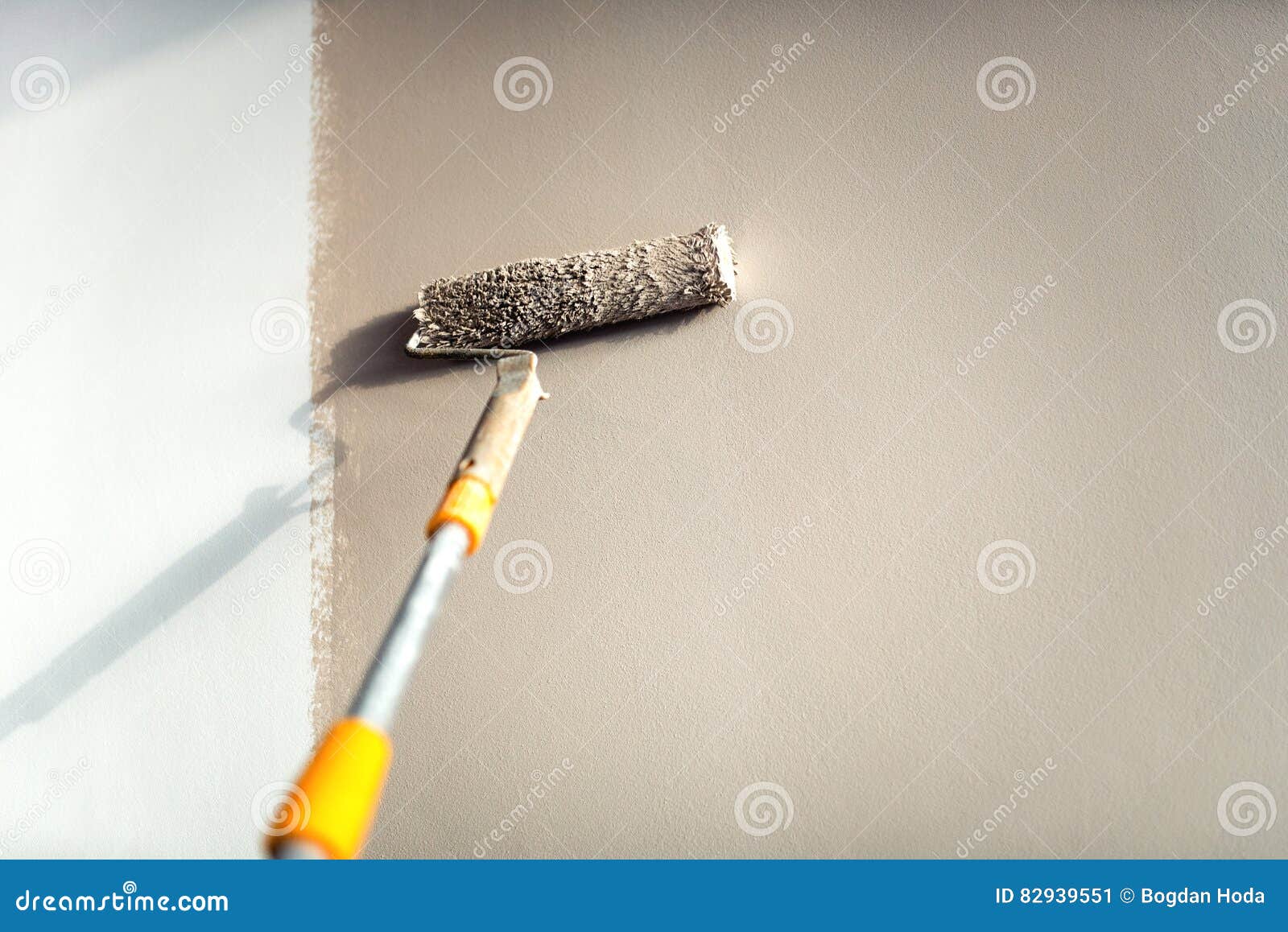 Construction Worker Painting Walls Using Paint Roller. Stock Image ...