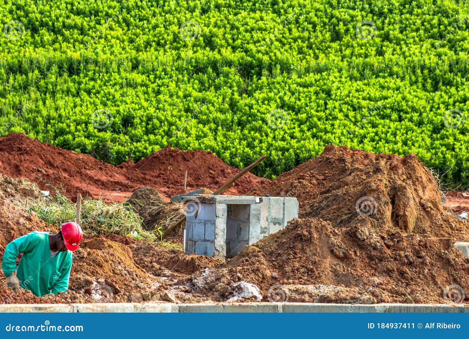 Construction Worker Performs the Construction of the Factory Shed ...