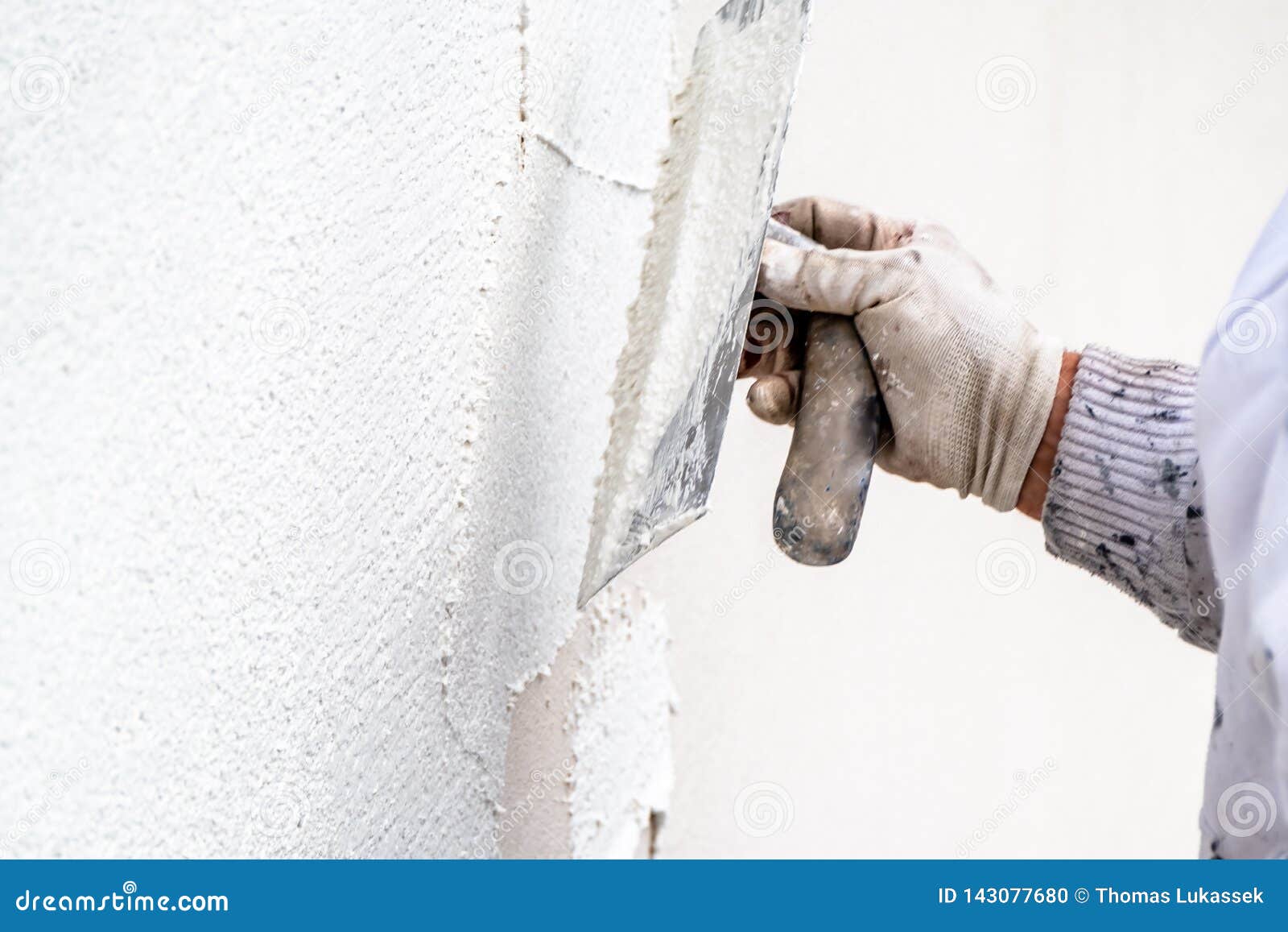 Construction Worker Plastering and Smoothing Concrete Wall with Cement ...