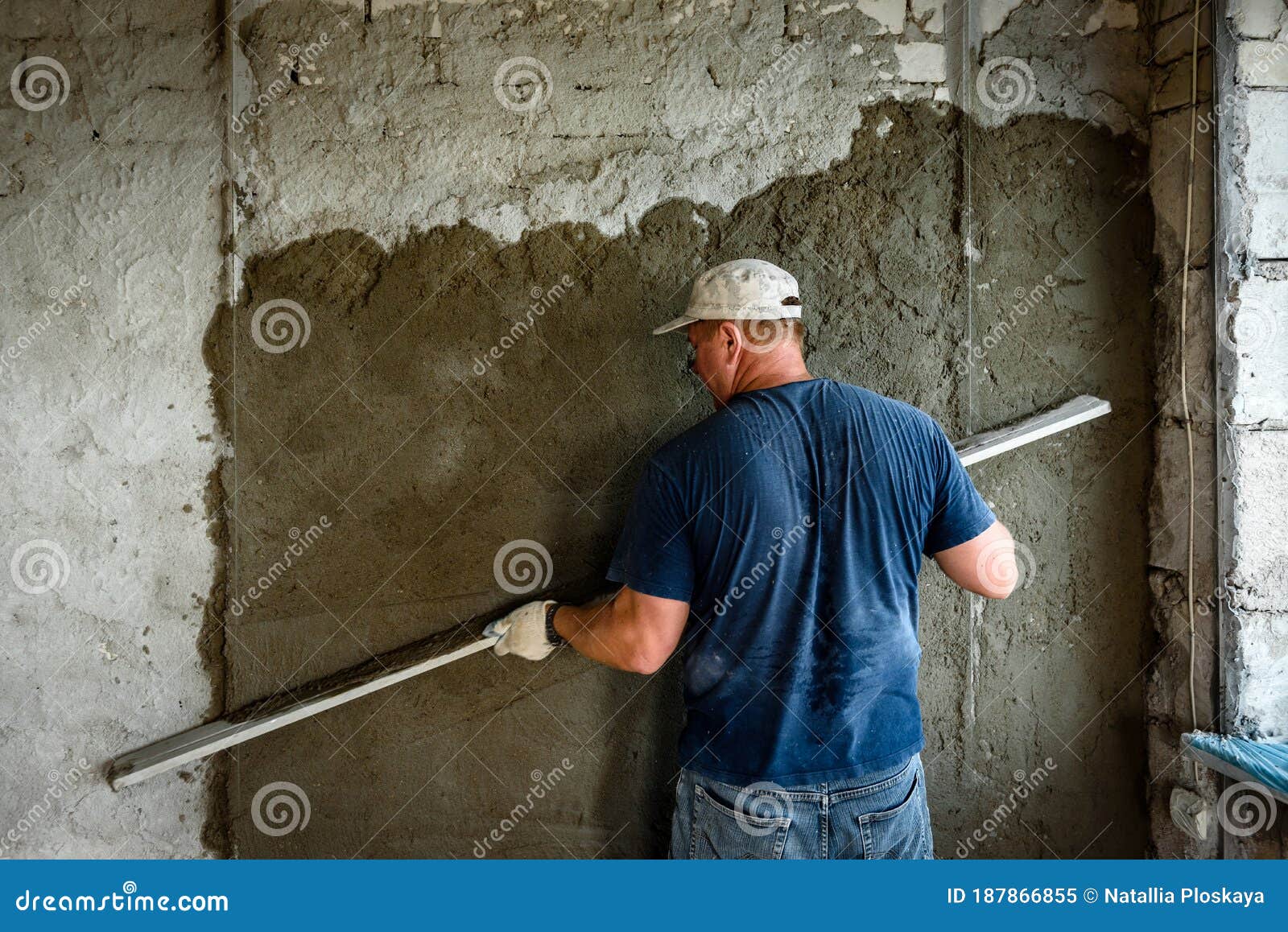 Construction Worker Plastering Wall with Leveler Stock Image - Image of ...
