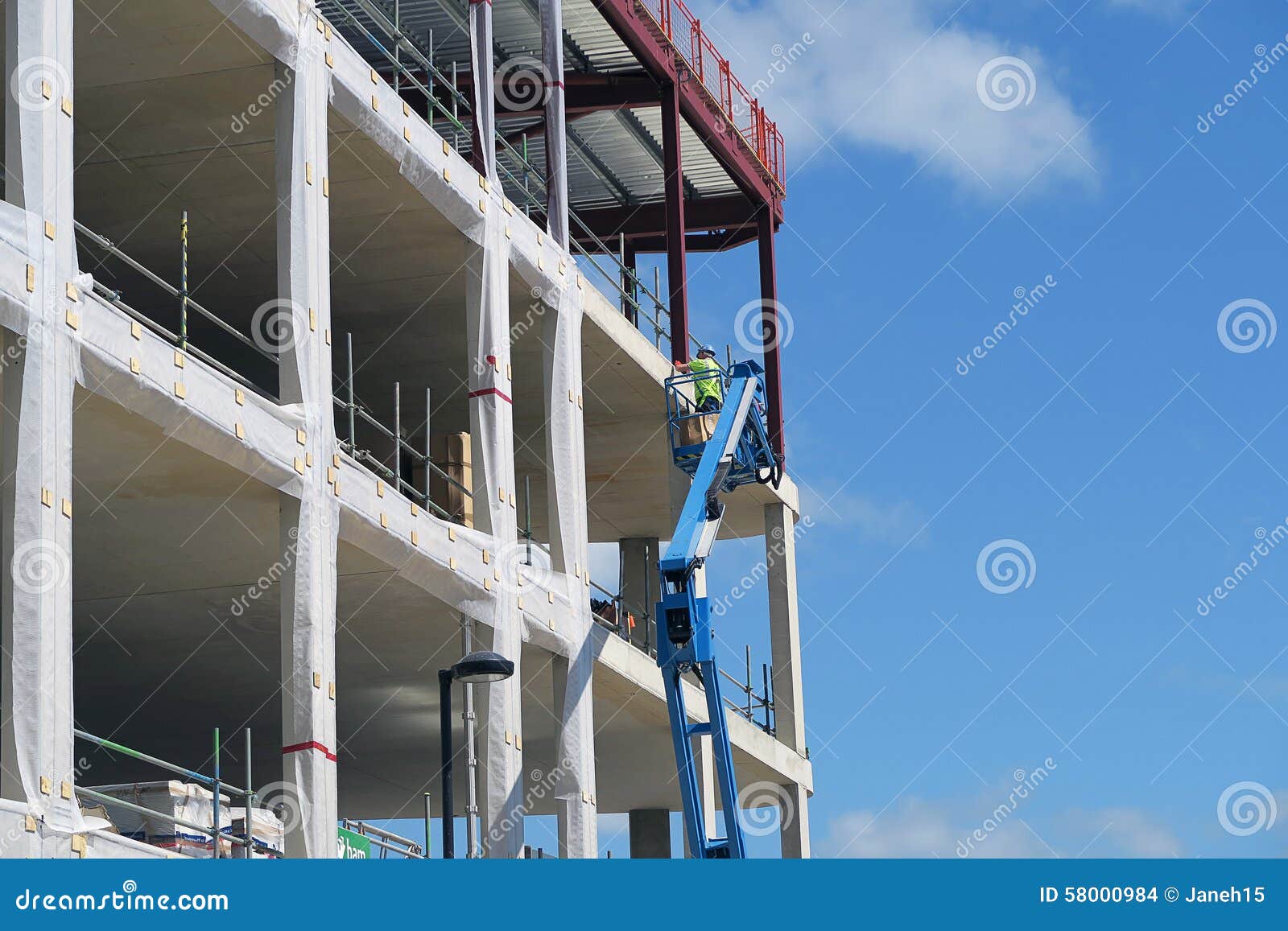Construction Worker on Platform Stock Photo - Image of city, occupation ...