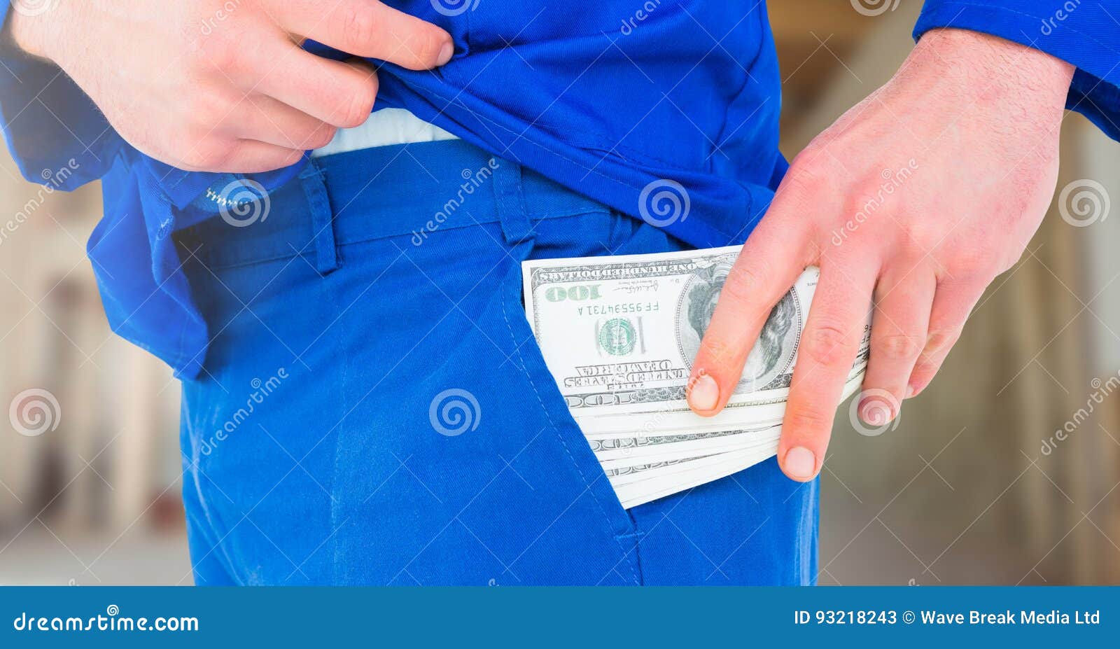 Construction Worker Pocketing Money Notes in Front of Construction Site ...