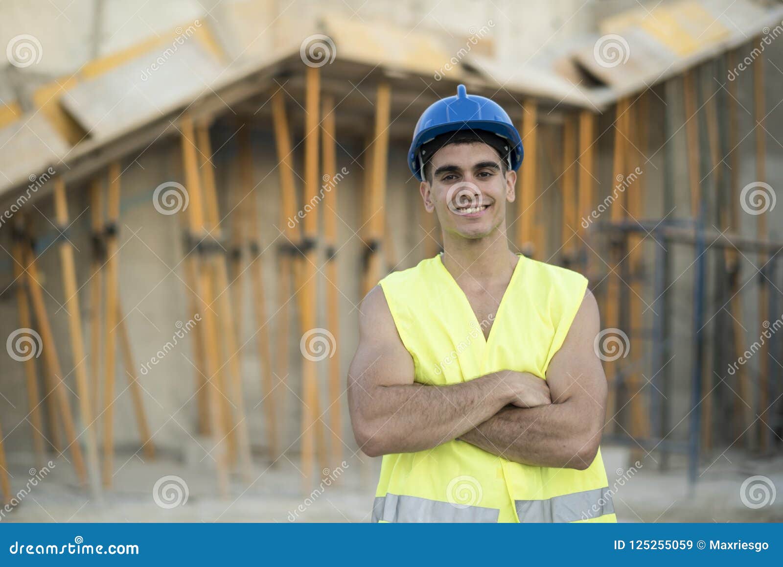 Construction Worker Posing and Looking at Camera, Smiling in Building ...