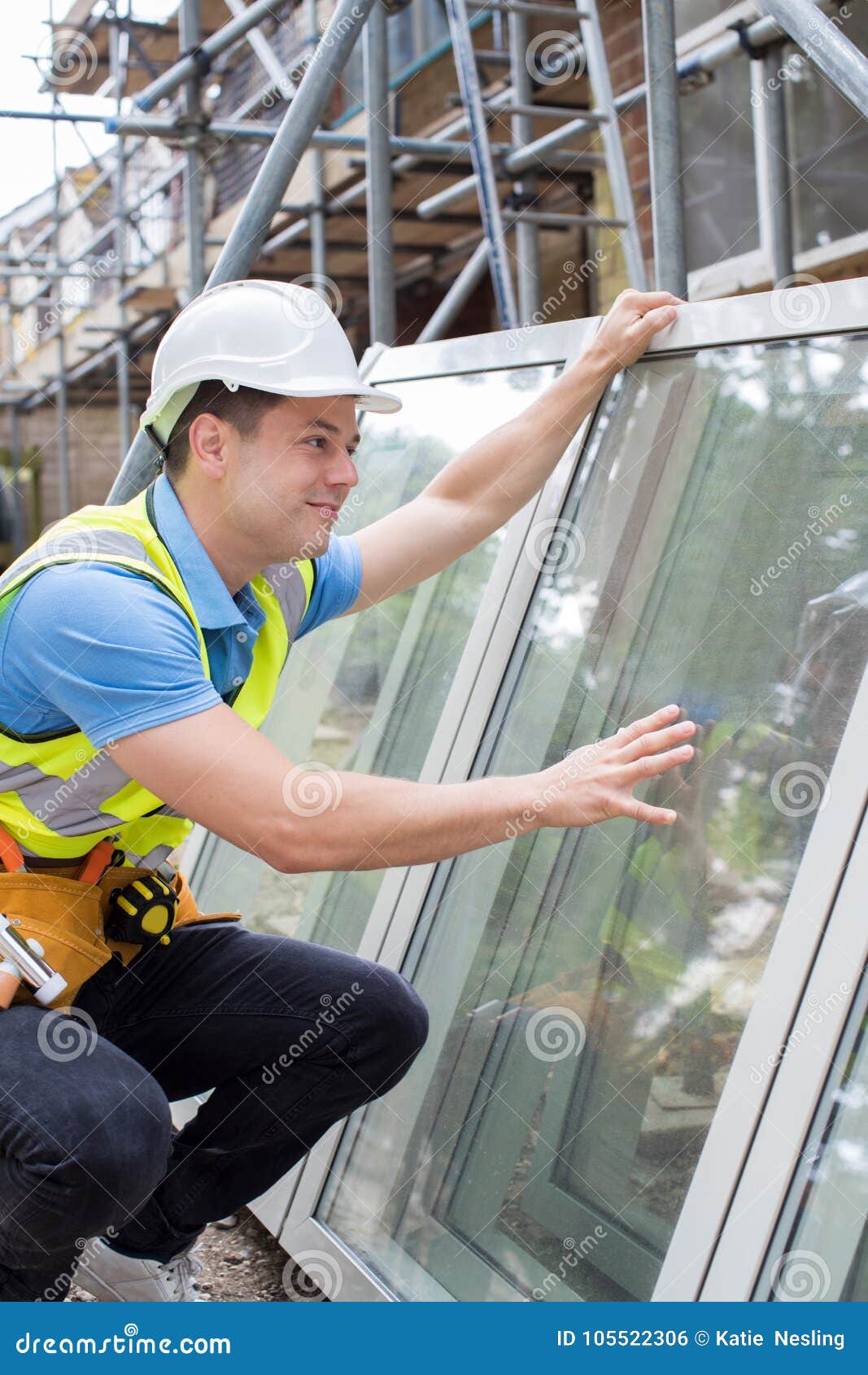 Construction Worker Preparing To Fit New Windows Stock Photo - Image of ...