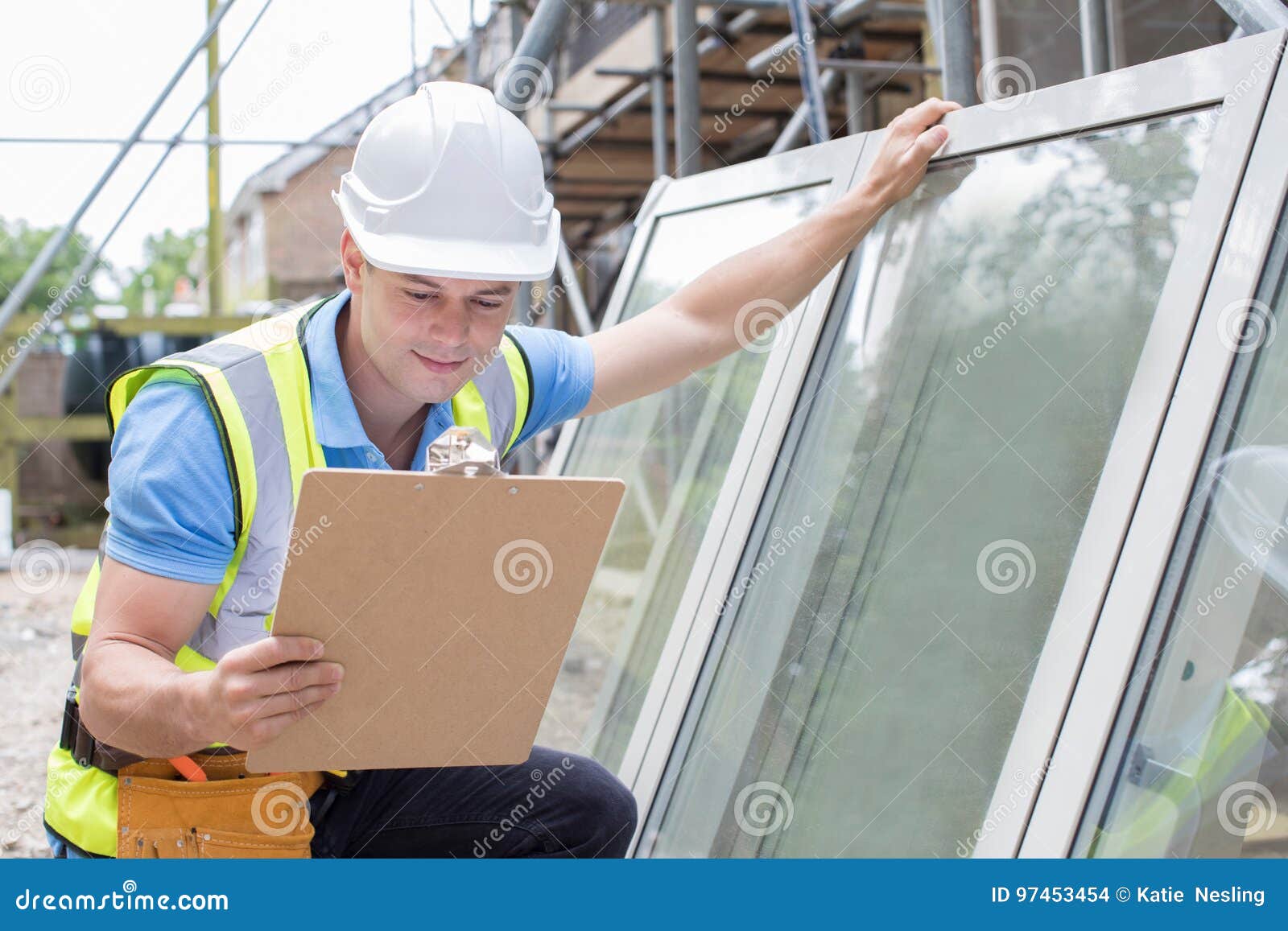 Construction Worker Preparing To Fit New Windows Stock Photo - Image of ...