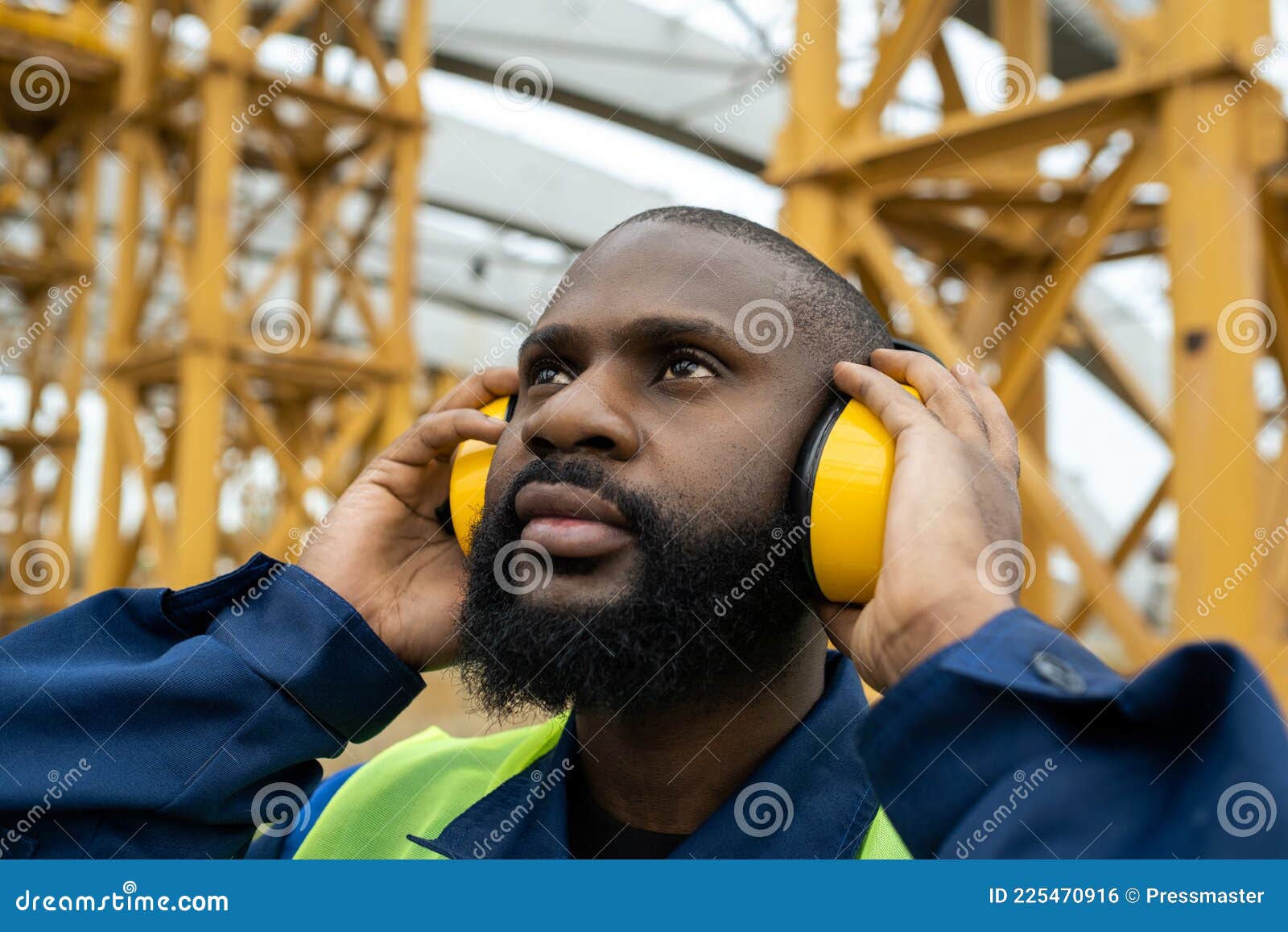 Construction Worker in Protective Headphones Stock Photo - Image of ...