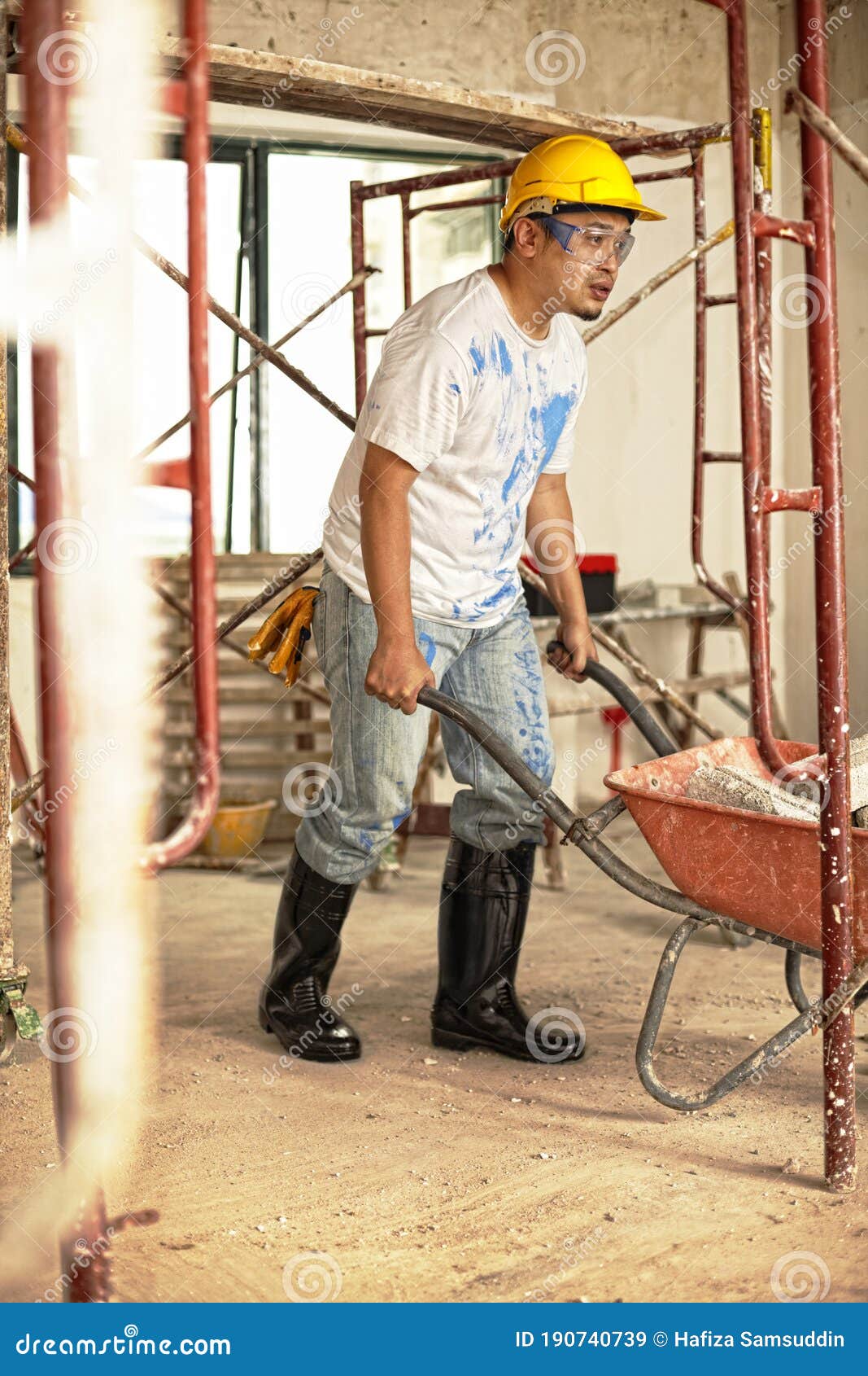 Construction Worker Pushing Wheelbarrow. Conceptual Image Stock Image ...