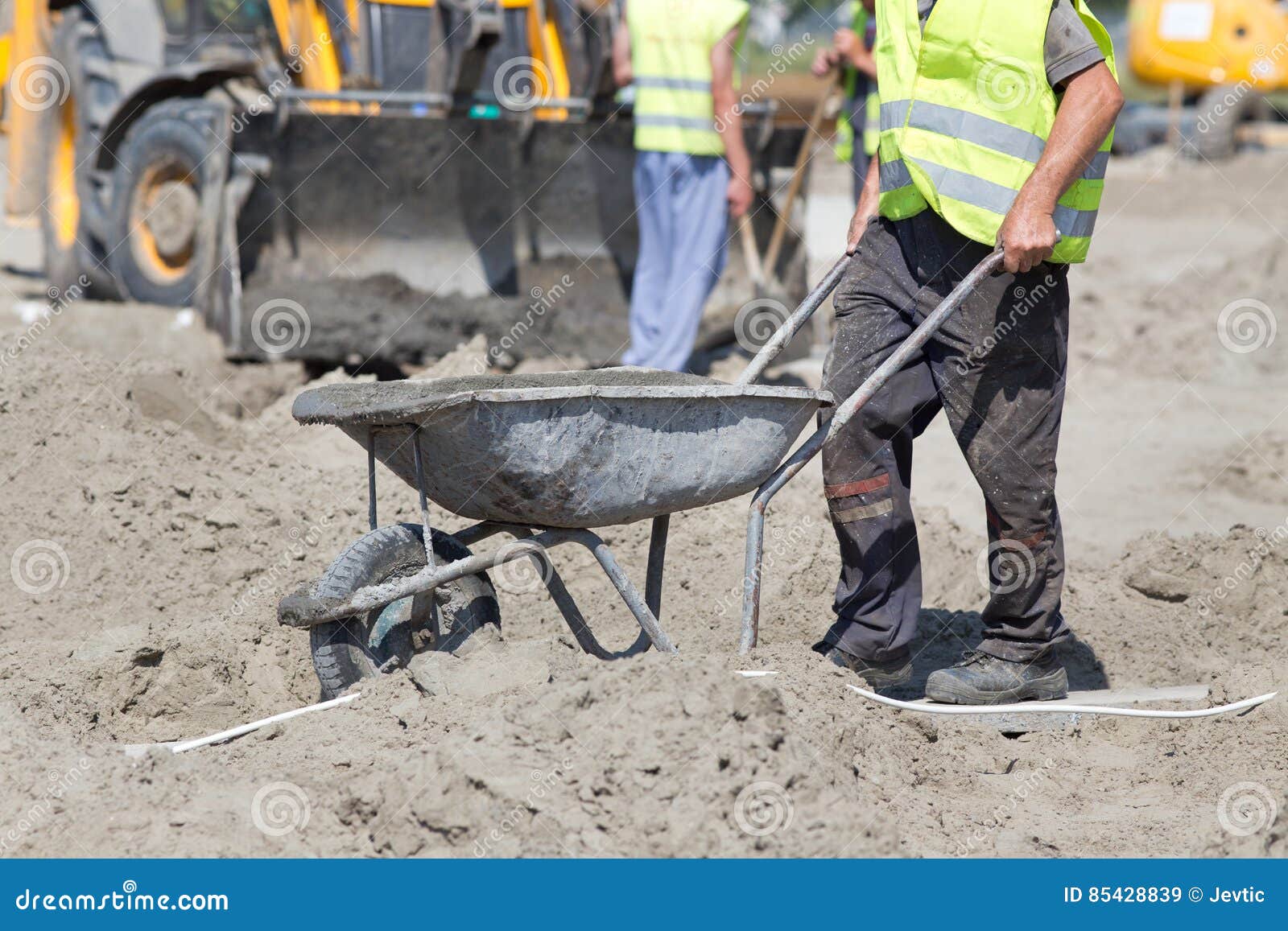 Construction Worker Pushing Wheelbarrow Stock Image - Image of liquid ...