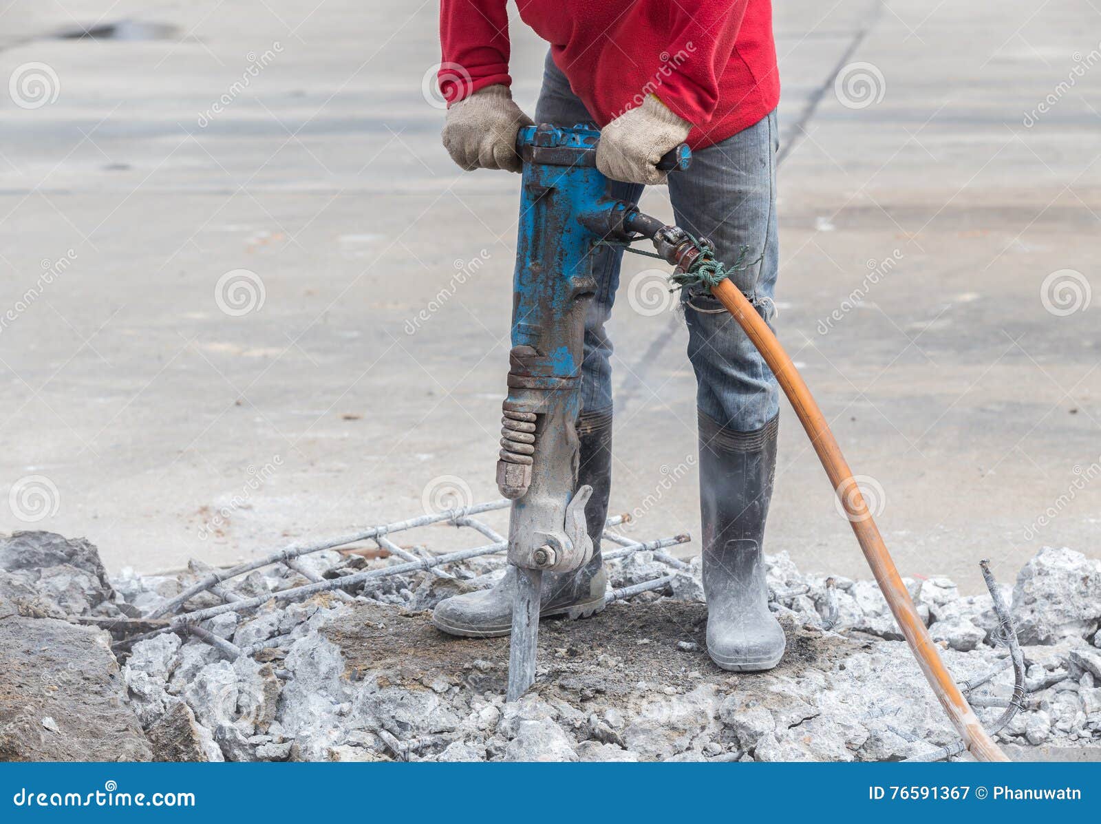 Construction Worker Removes Excess Concrete with Drilling Machin Stock ...