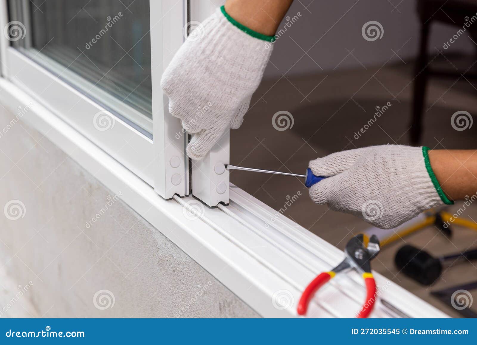 Construction Worker Repairing the Sliding Window. Open Cap of Adjust ...