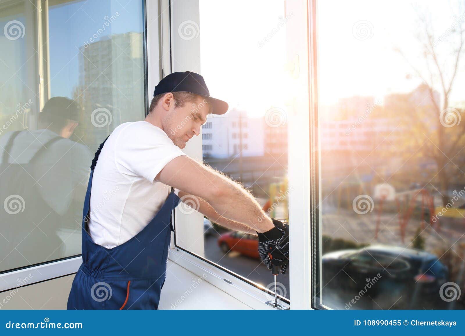 Construction Worker Repairing Window Stock Image - Image of mature ...