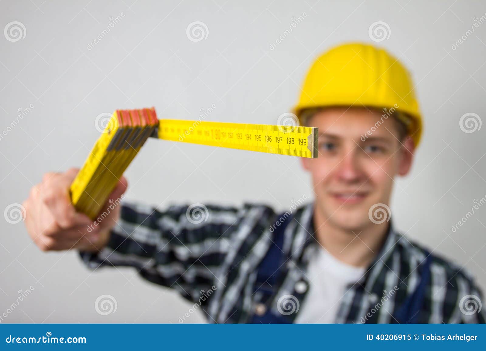 Construction Worker with a Ruler Stock Image - Image of person ...