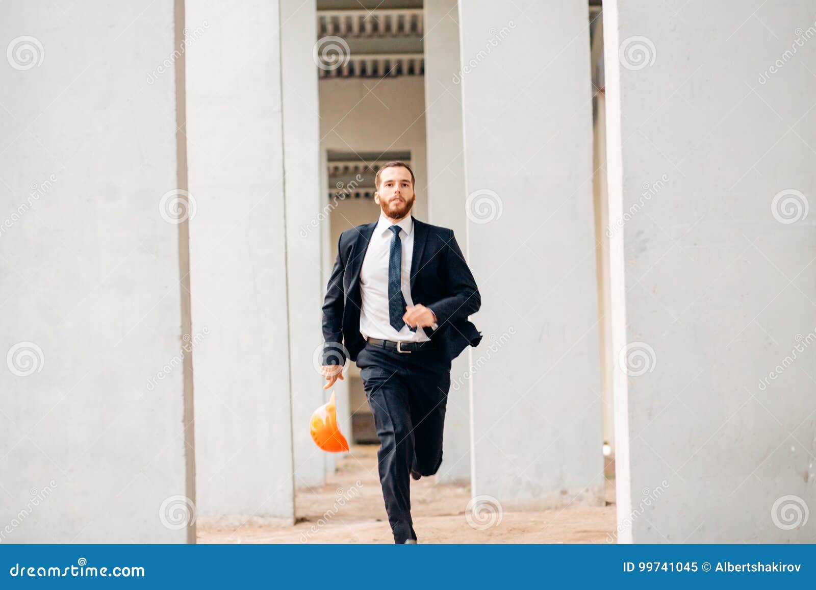Construction Worker Running from Danger on Construction Site Stock ...