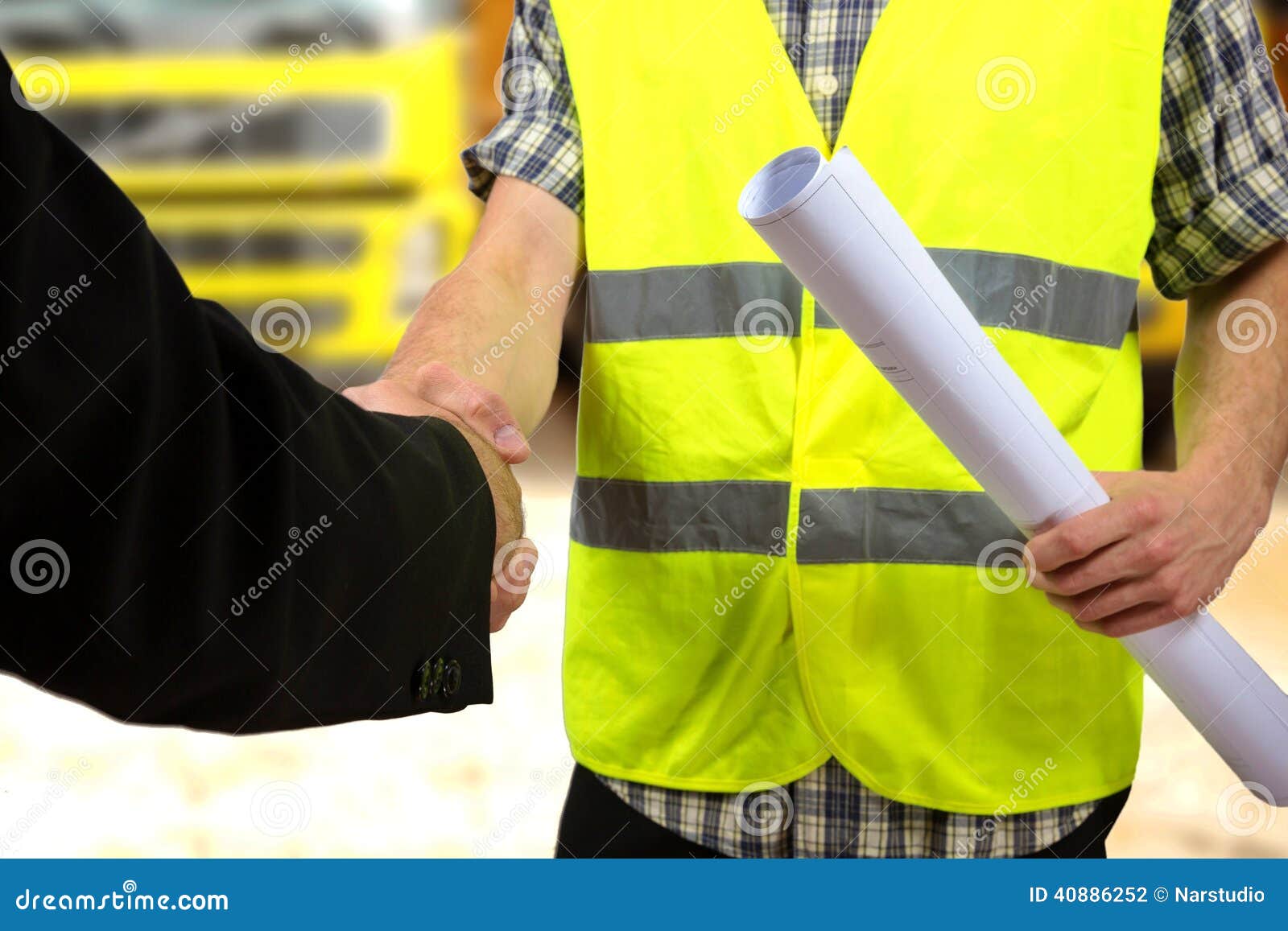 Construction Worker S Hand Holding Project Documents and Shaking Hands ...