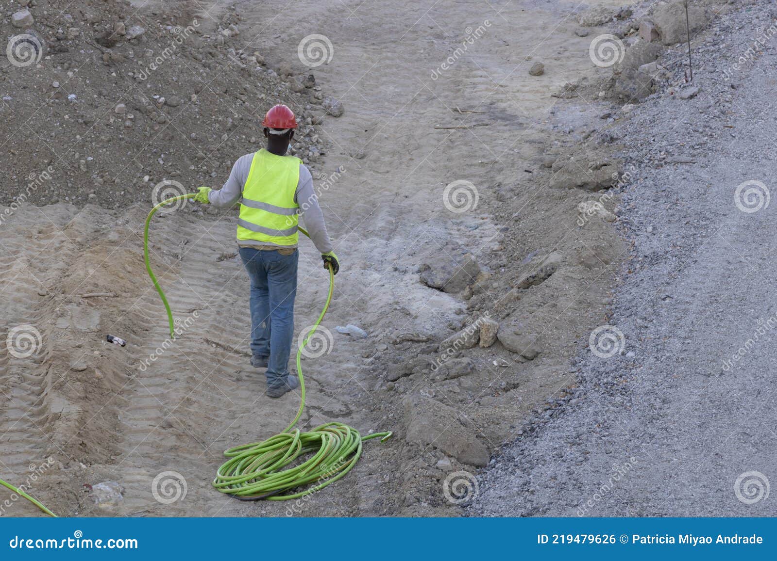 Construction Worker in the Sand Stock Photo - Image of carry, worker ...