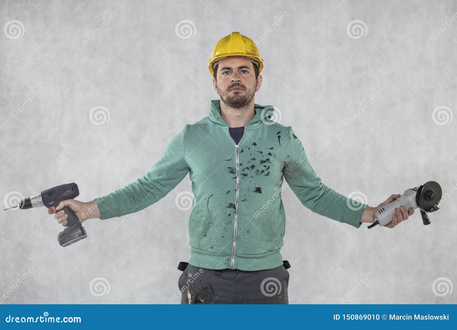 The Construction Worker Shows the Tools Necessary for His Work, Front ...