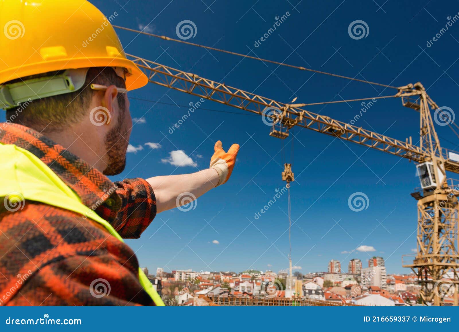 Construction Worker Signaling To Crane Operator Stock Image - Image of ...
