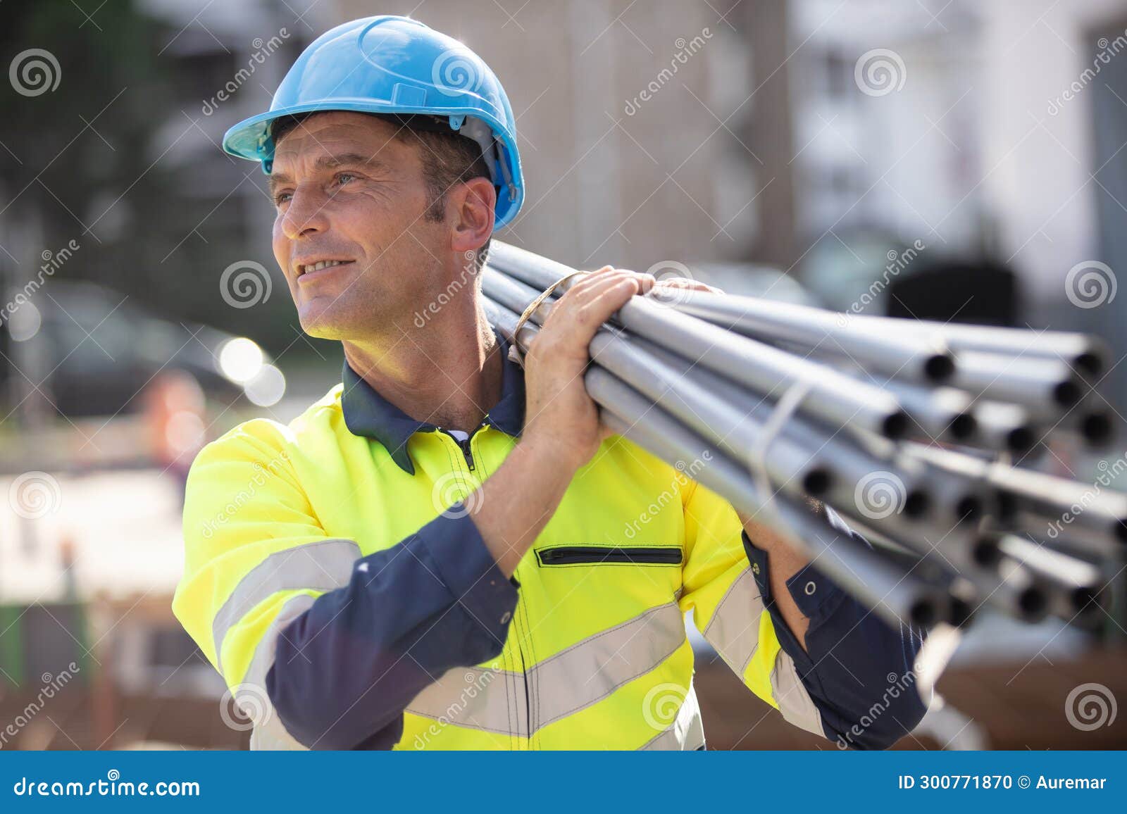 Construction Worker on Site Holding Pipe Stock Photo - Image of worker ...