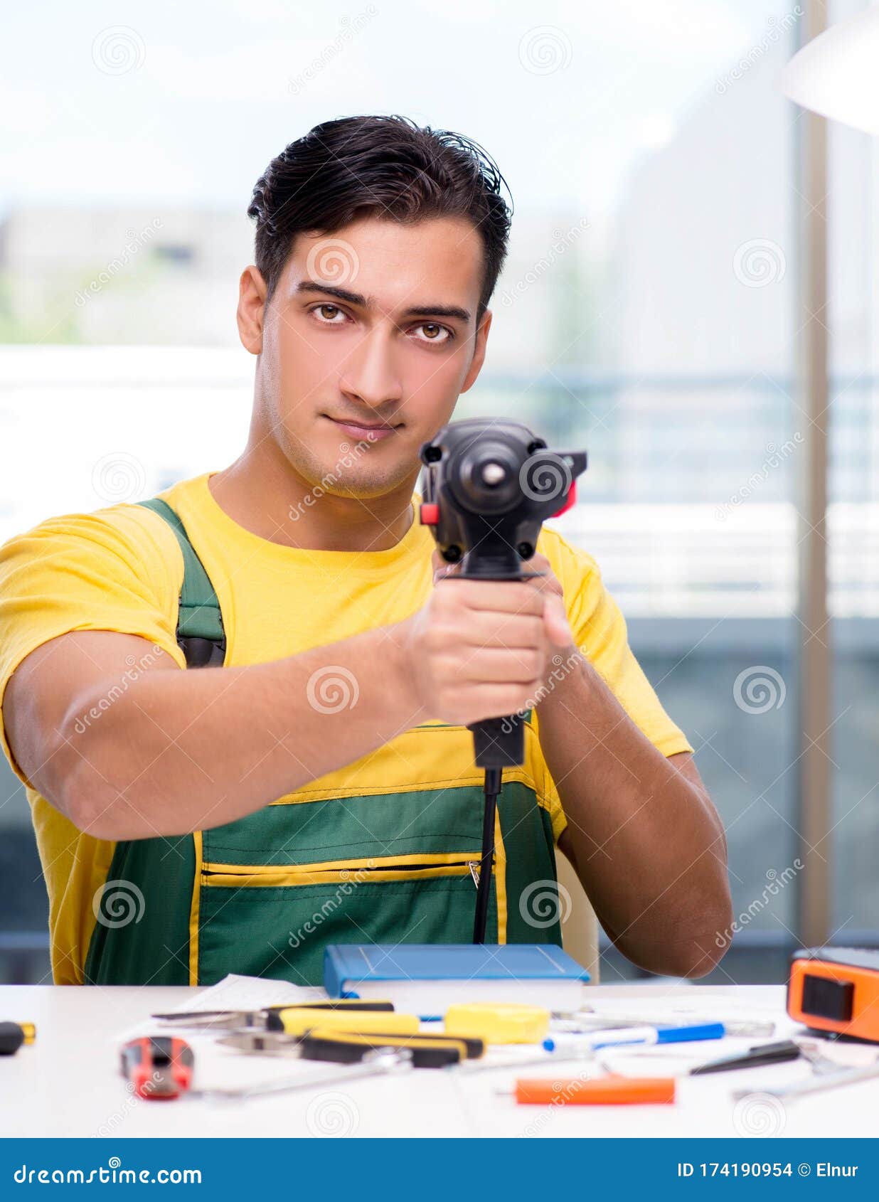 Construction Worker Sitting at the Desk Stock Photo - Image of ...