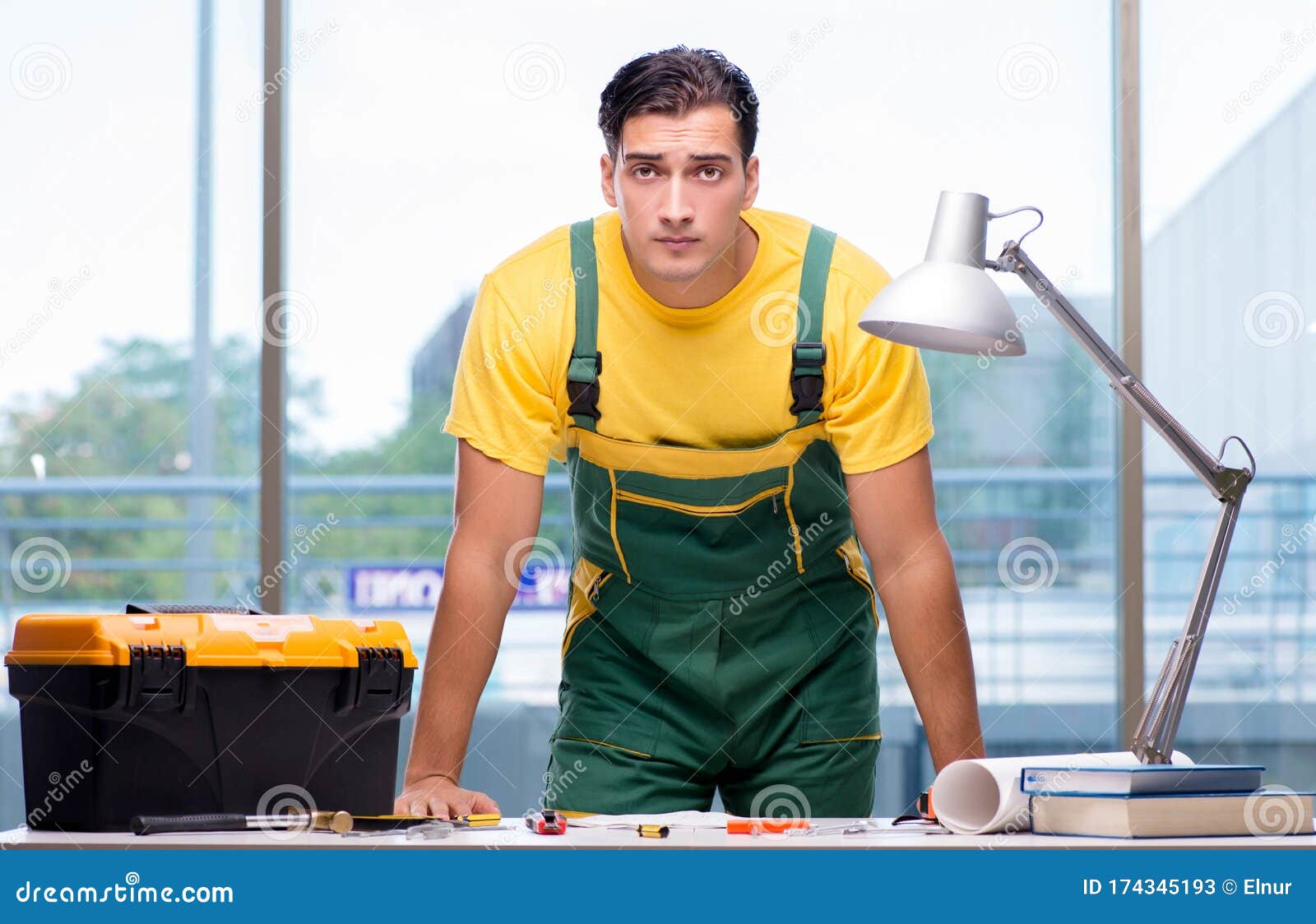 Construction Worker Sitting at the Desk Stock Image - Image of ...
