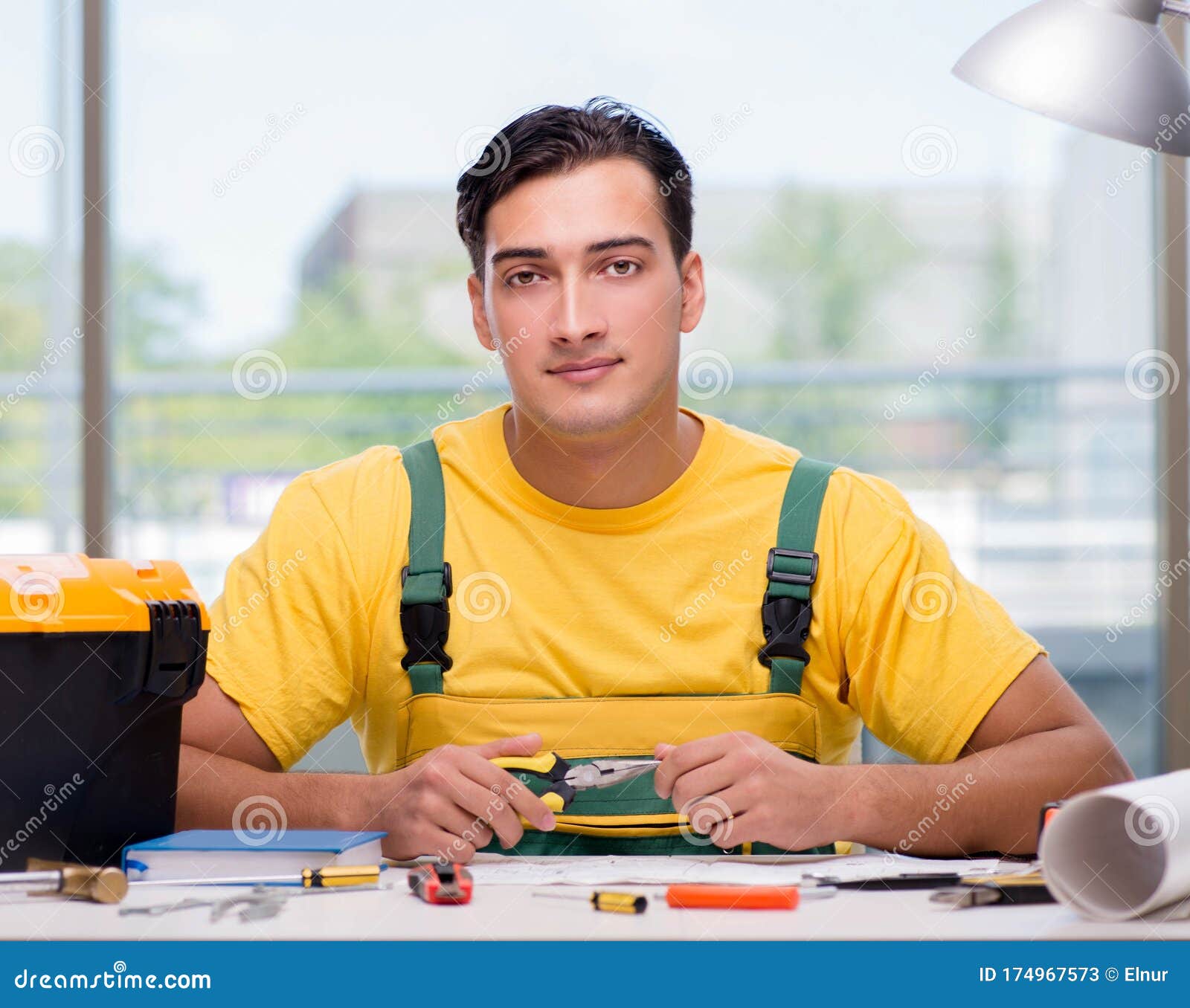 Construction Worker Sitting at the Desk Stock Image - Image of ...