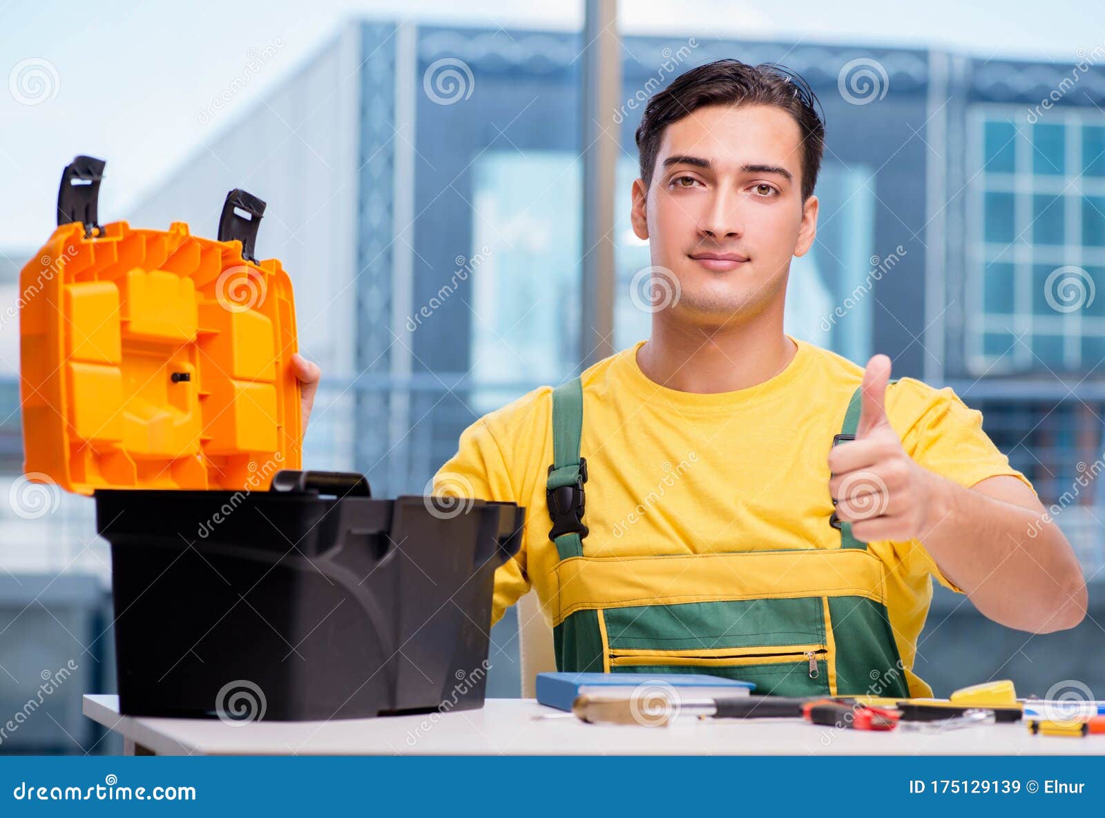 Construction Worker Sitting at the Desk Stock Image - Image of plumber ...