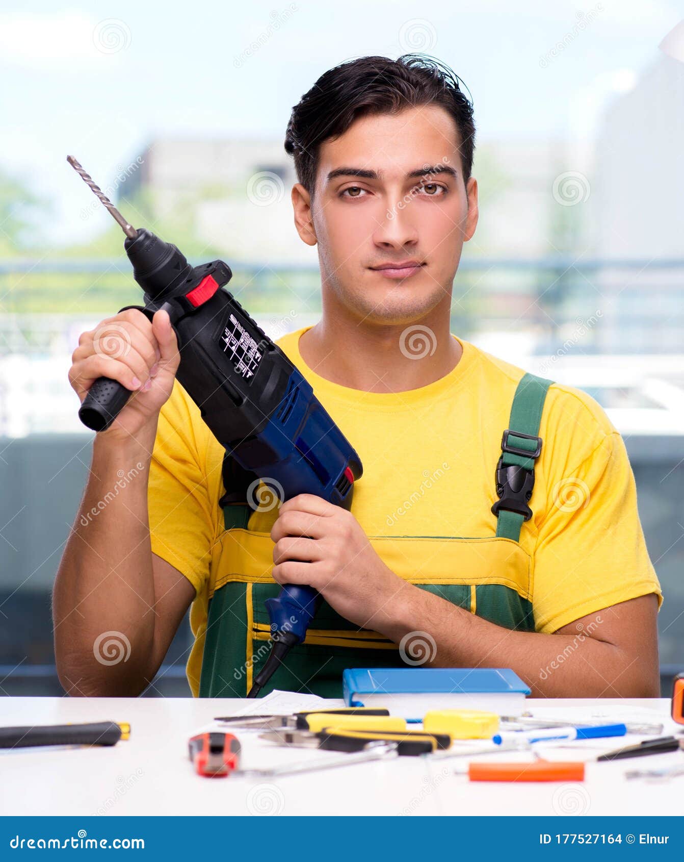 Construction Worker Sitting at the Desk Stock Photo - Image of ...