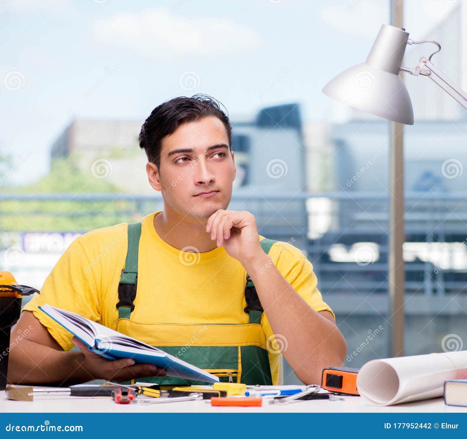 Construction Worker Sitting at the Desk Stock Photo - Image of foreman ...
