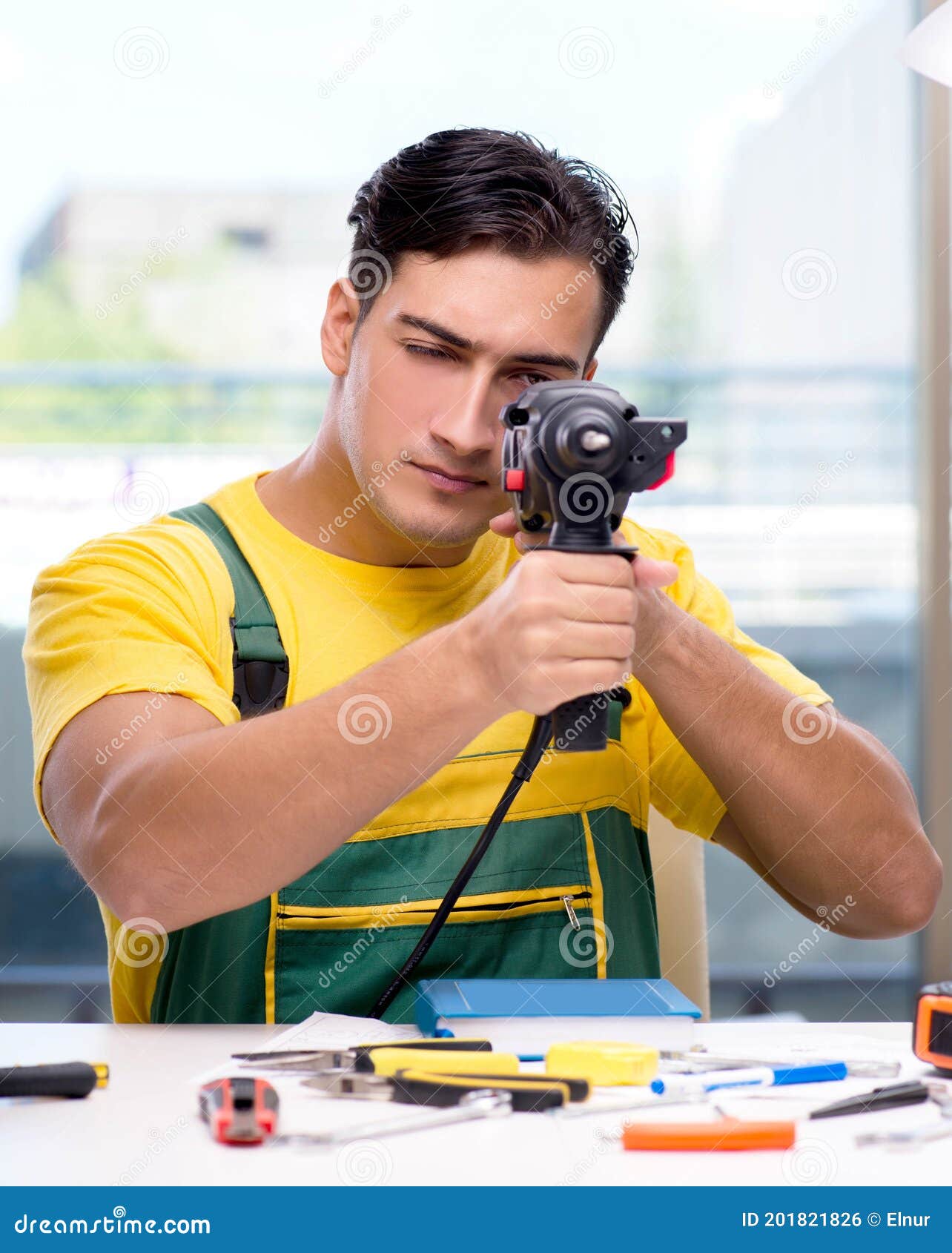 Construction Worker Sitting at the Desk Stock Photo - Image of ...