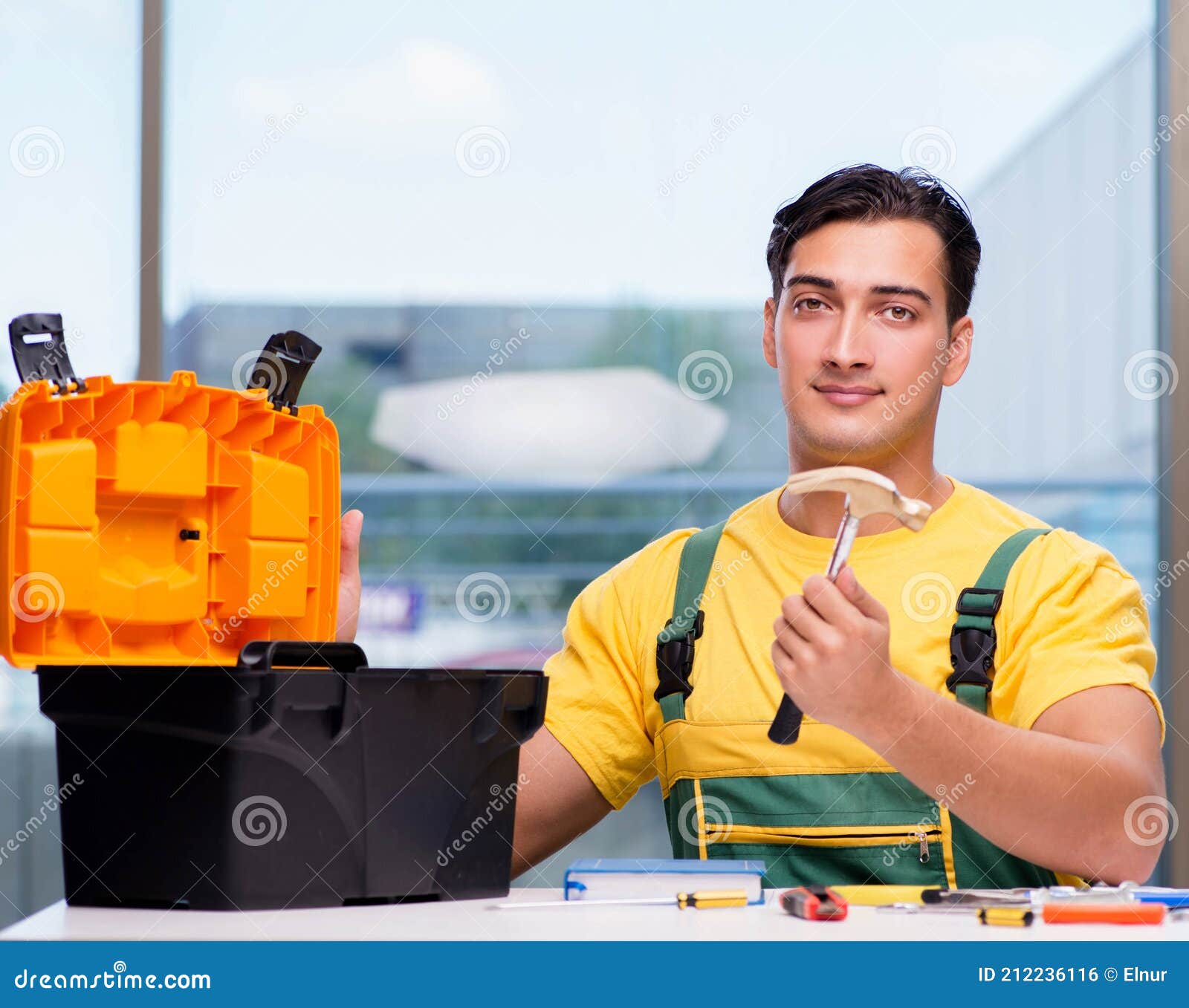Construction Worker Sitting at the Desk Stock Photo - Image of builder ...