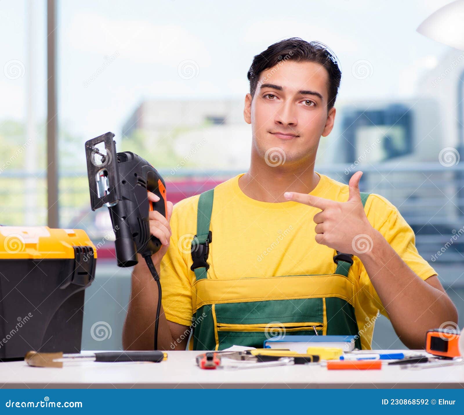 Construction Worker Sitting at the Desk Stock Photo - Image of ...