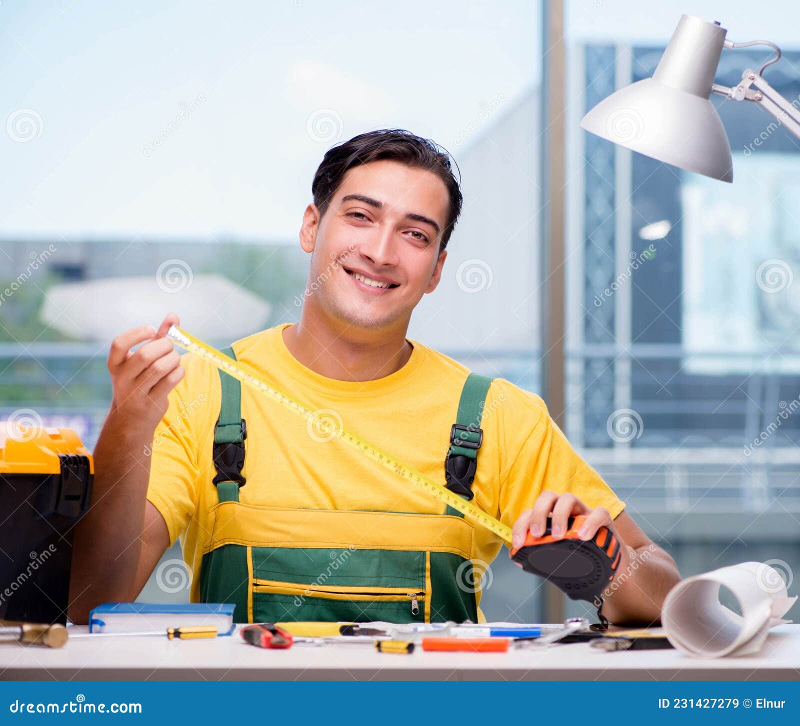 Construction Worker Sitting at the Desk Stock Image - Image of ...