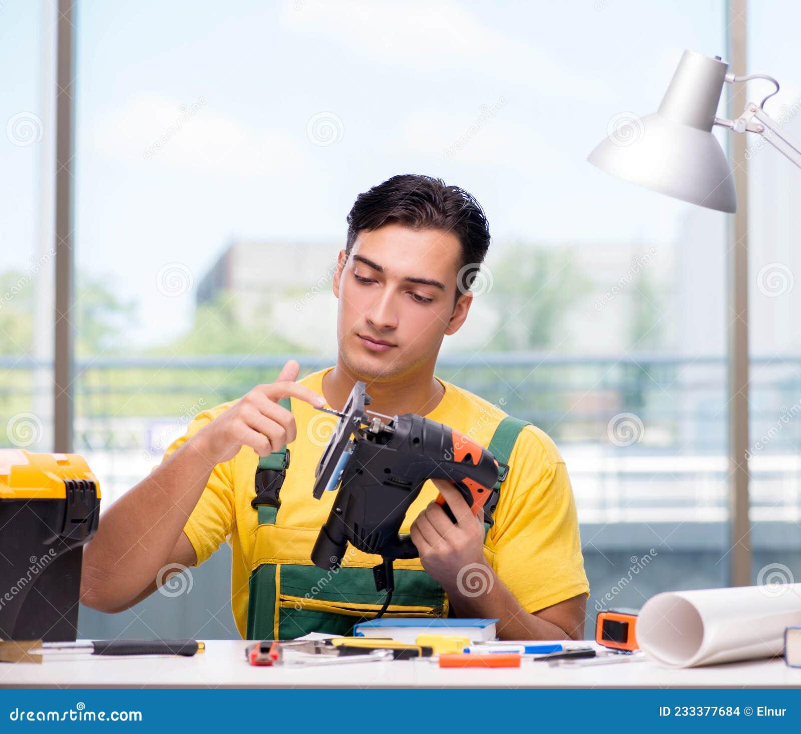 Construction Worker Sitting at the Desk Stock Photo - Image of timber ...