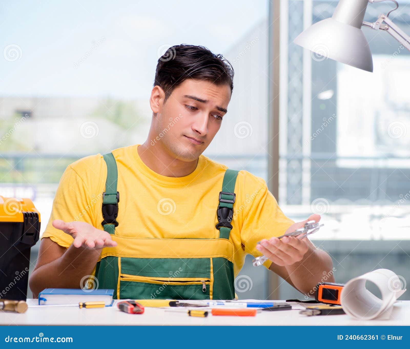 Construction Worker Sitting at the Desk Stock Image - Image of ...
