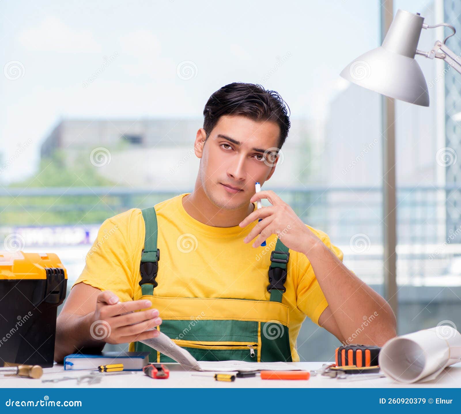 Construction Worker Sitting at the Desk Stock Image - Image of ...