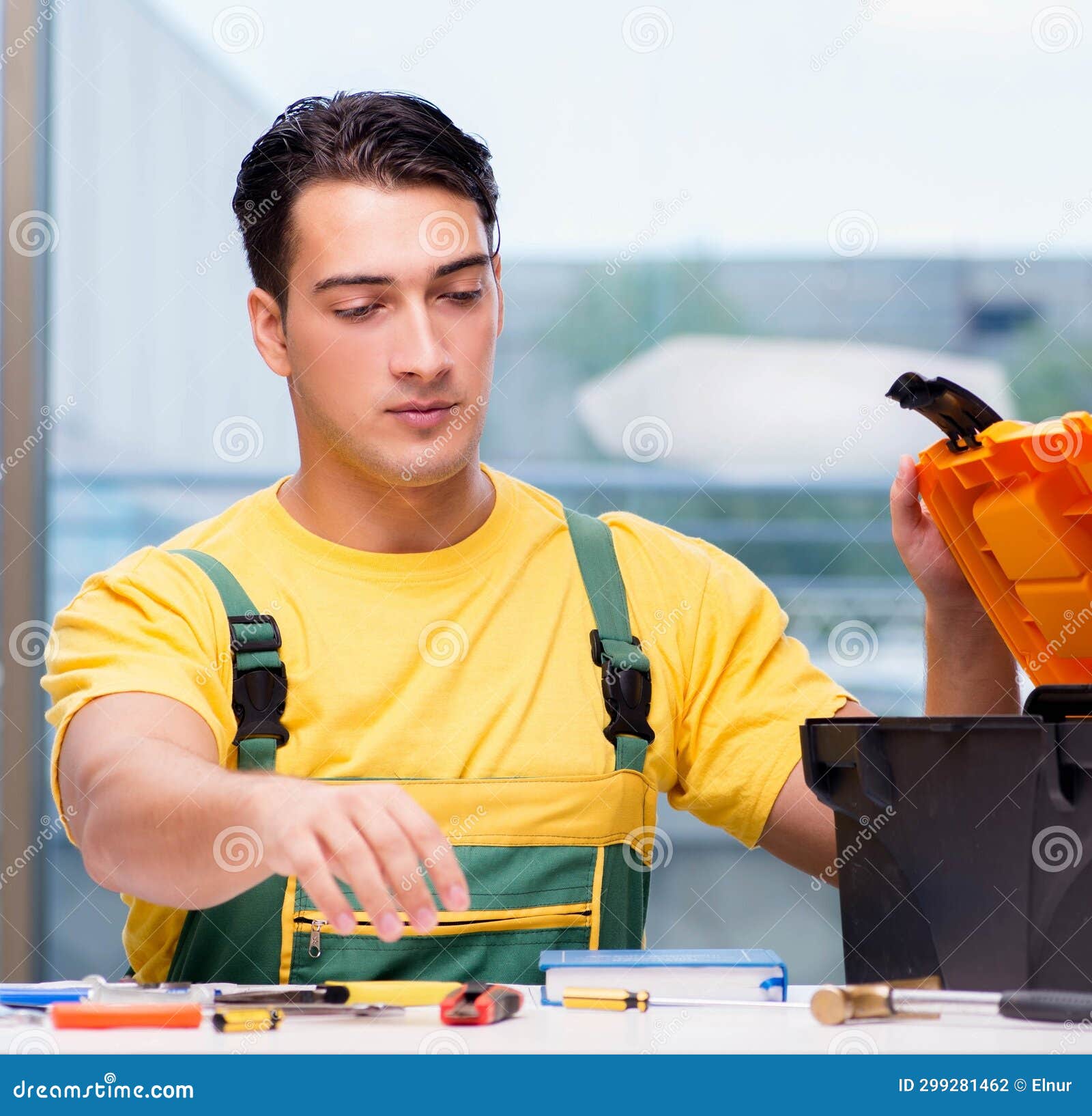 Construction Worker Sitting at the Desk Stock Photo - Image of ...