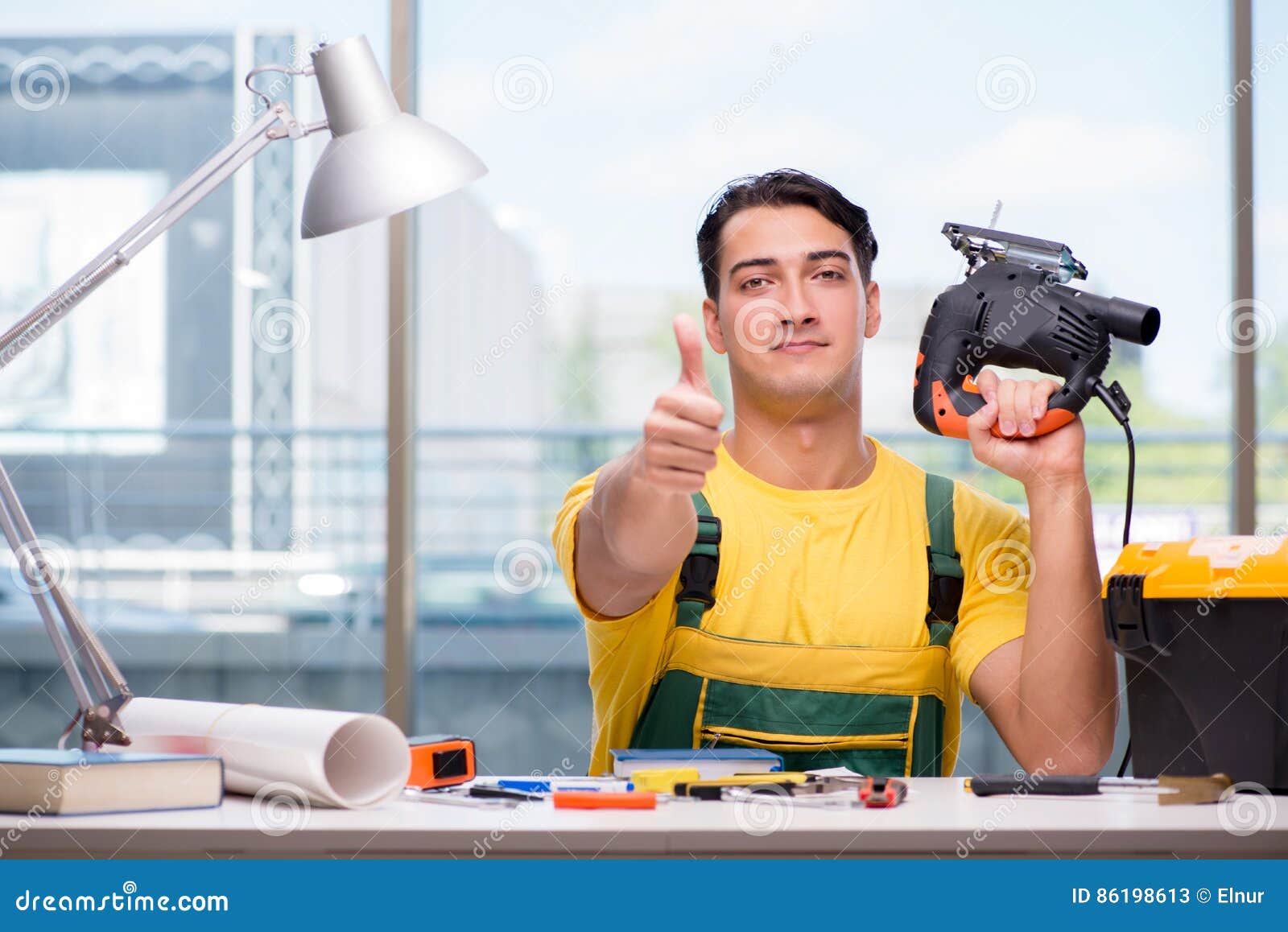 The Construction Worker Sitting at the Desk Stock Image - Image of ...