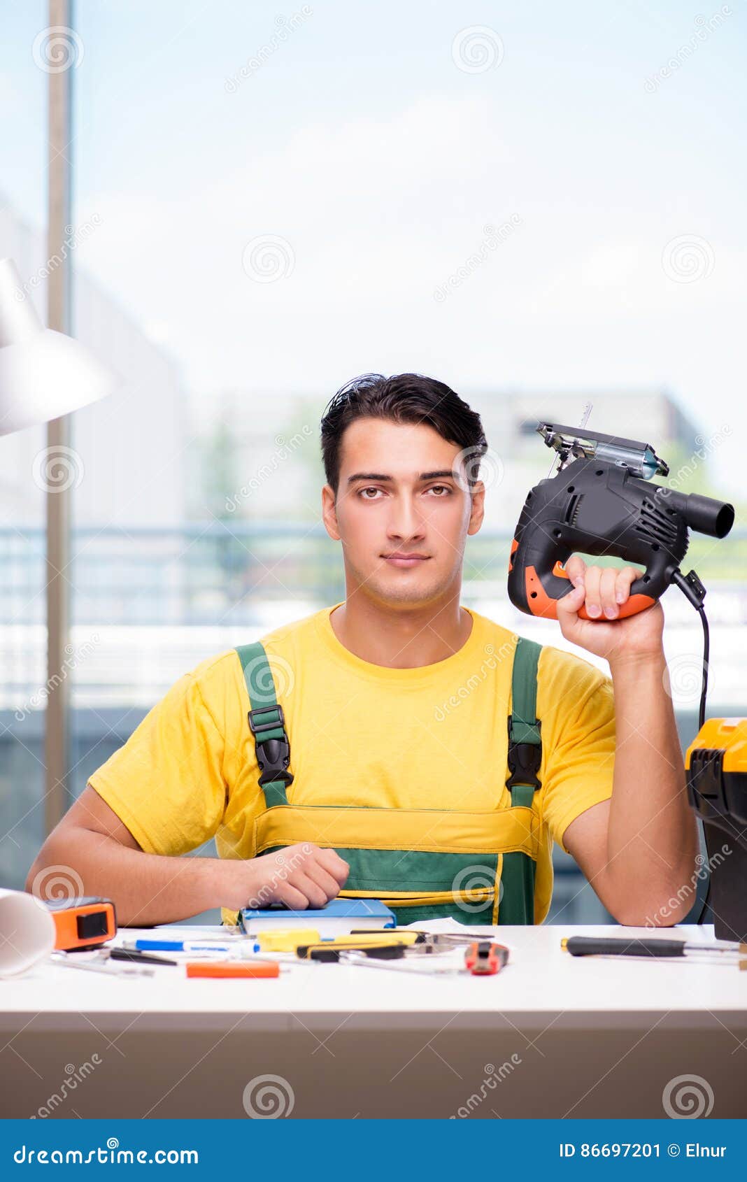The Construction Worker Sitting at the Desk Stock Image - Image of ...