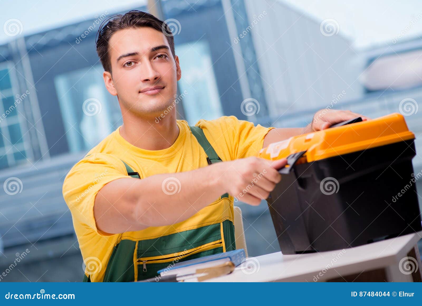 The Construction Worker Sitting at the Desk Stock Photo - Image of case ...