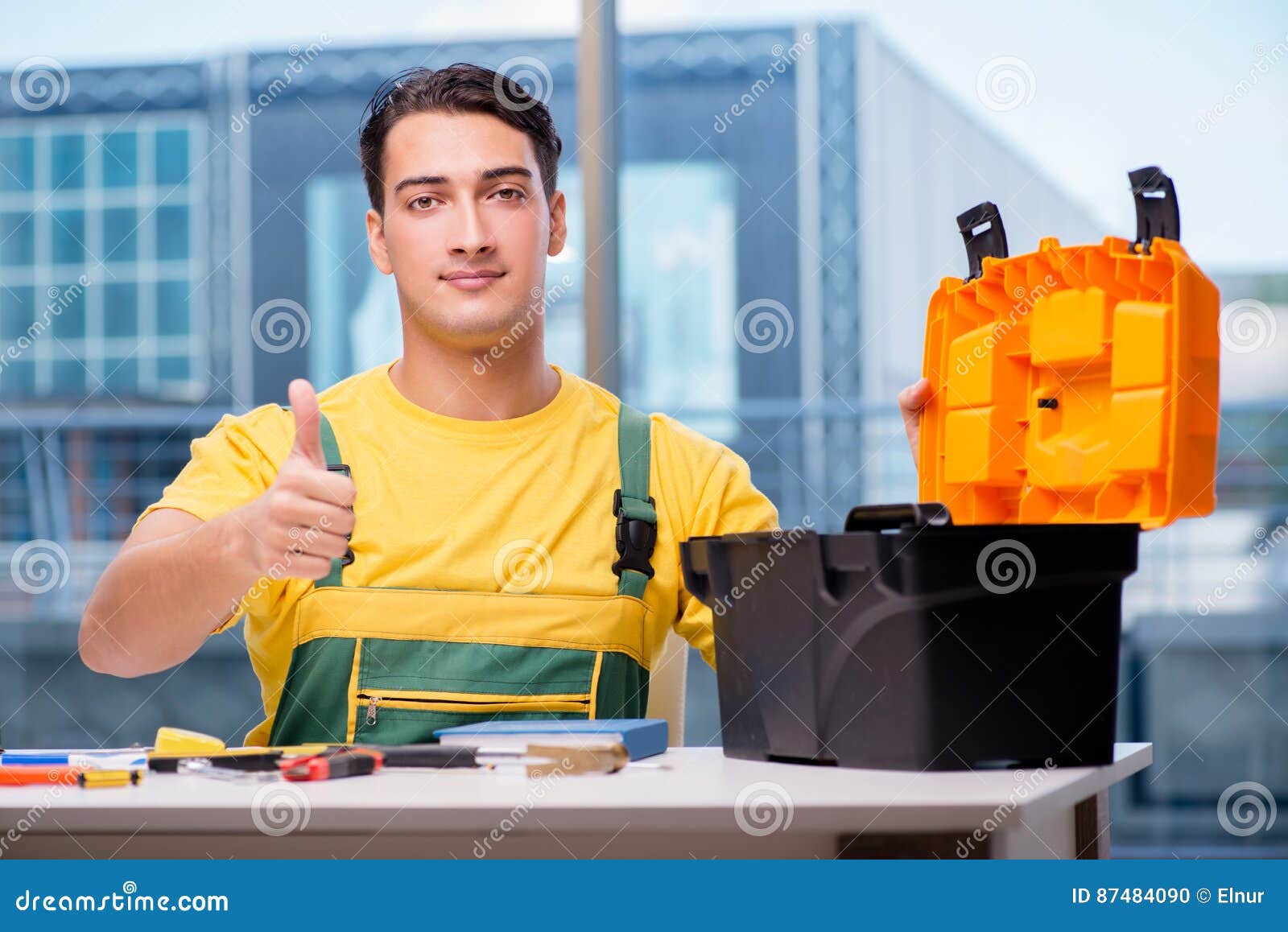 The Construction Worker Sitting at the Desk Stock Photo - Image of ...