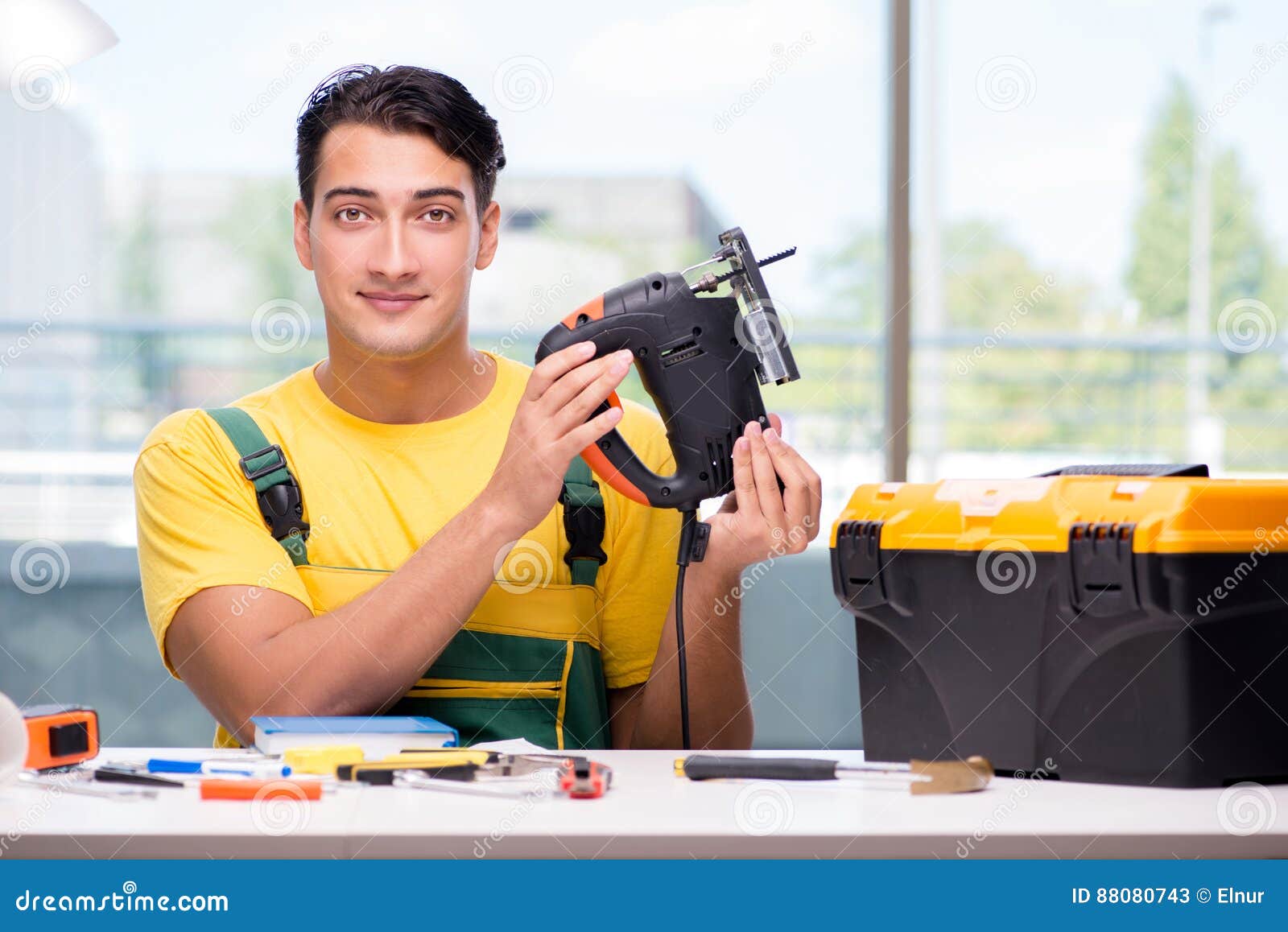 The Construction Worker Sitting at the Desk Stock Image - Image of ...