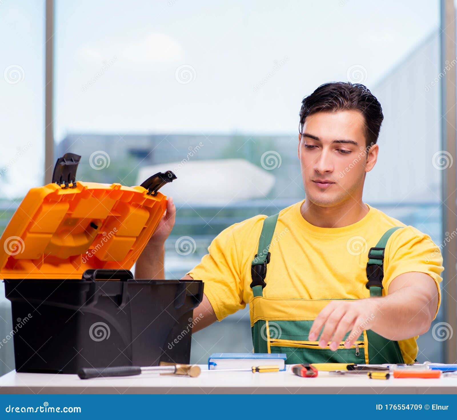 Construction Worker Sitting at the Desk Stock Image - Image of case ...