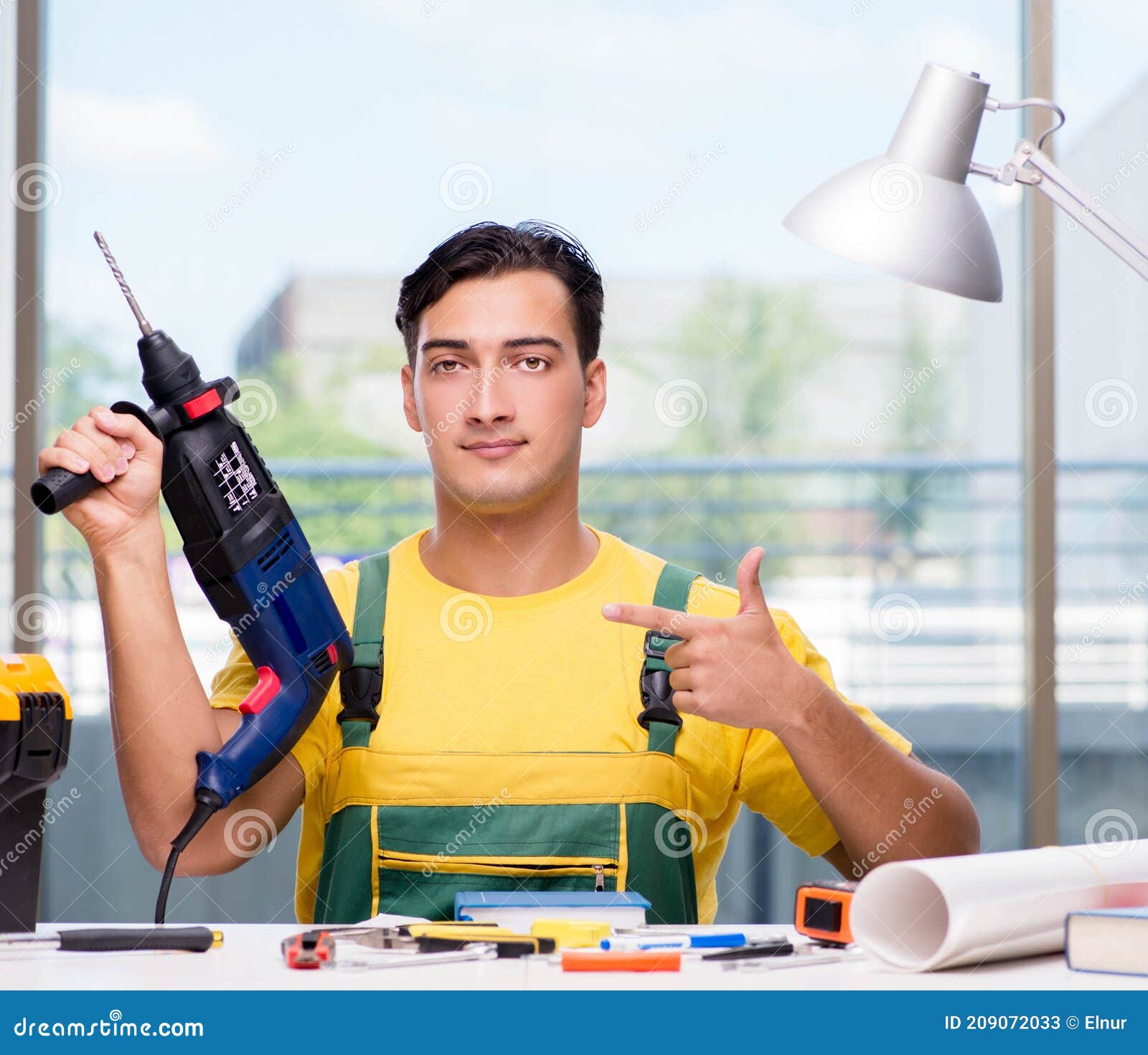 Construction Worker Sitting at the Desk Stock Image - Image of ...
