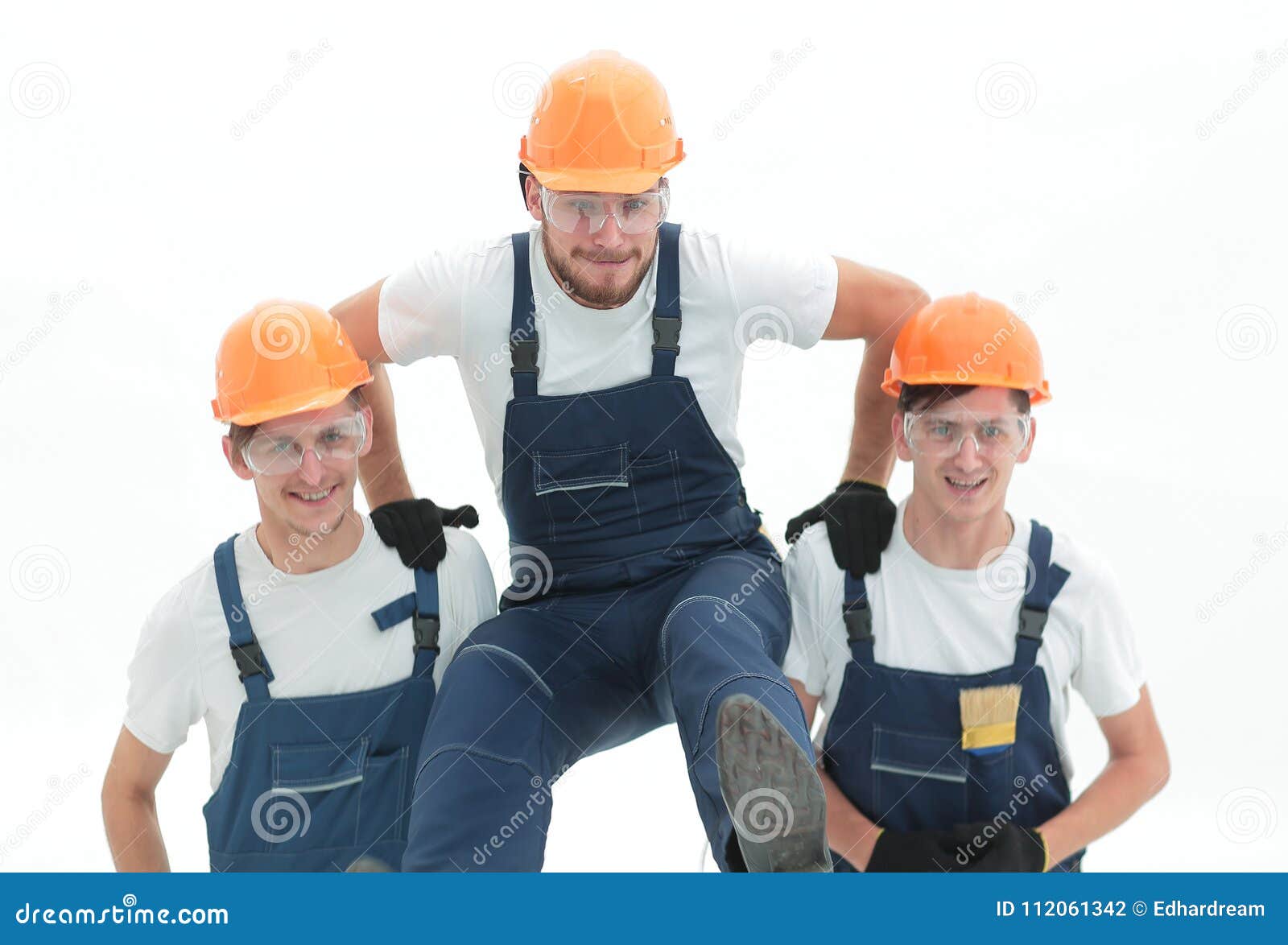 Construction Worker Sitting on the Shoulders of Colleagues Stock Photo ...