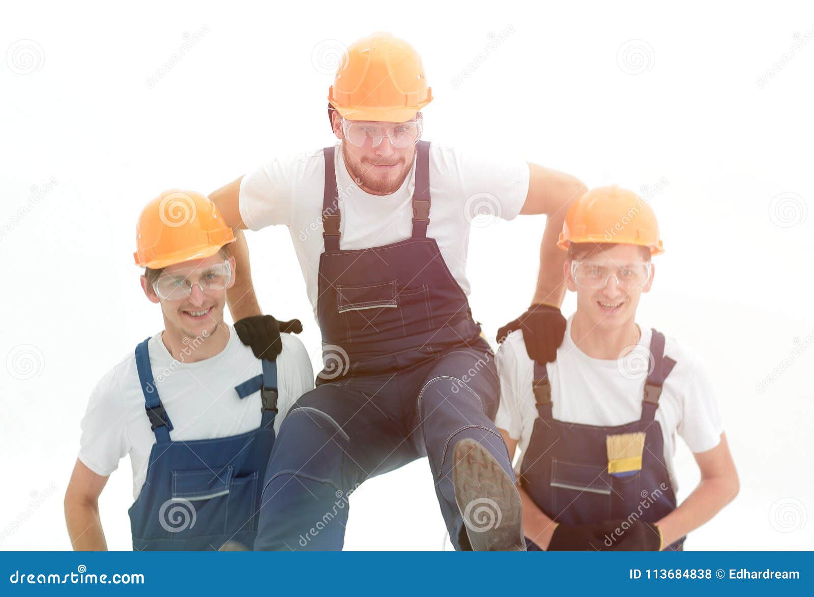 Construction Worker Sitting on the Shoulders of Colleagues Stock Photo ...